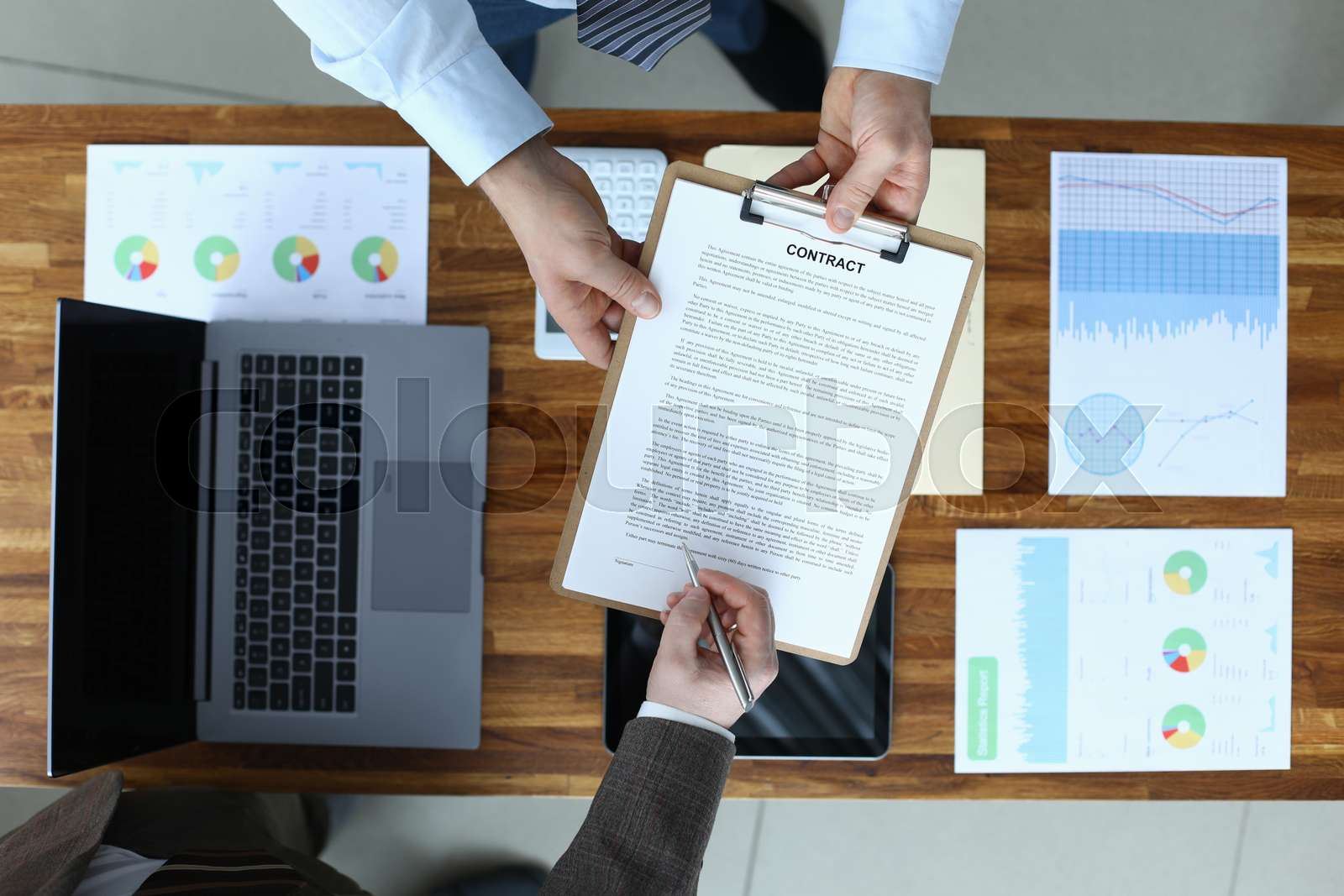 Man holding paper folder | Stock image | Colourbox