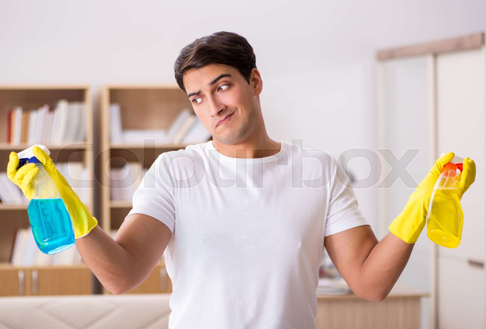 Man husband cleaning the house helping wife | Stock image | Colourbox