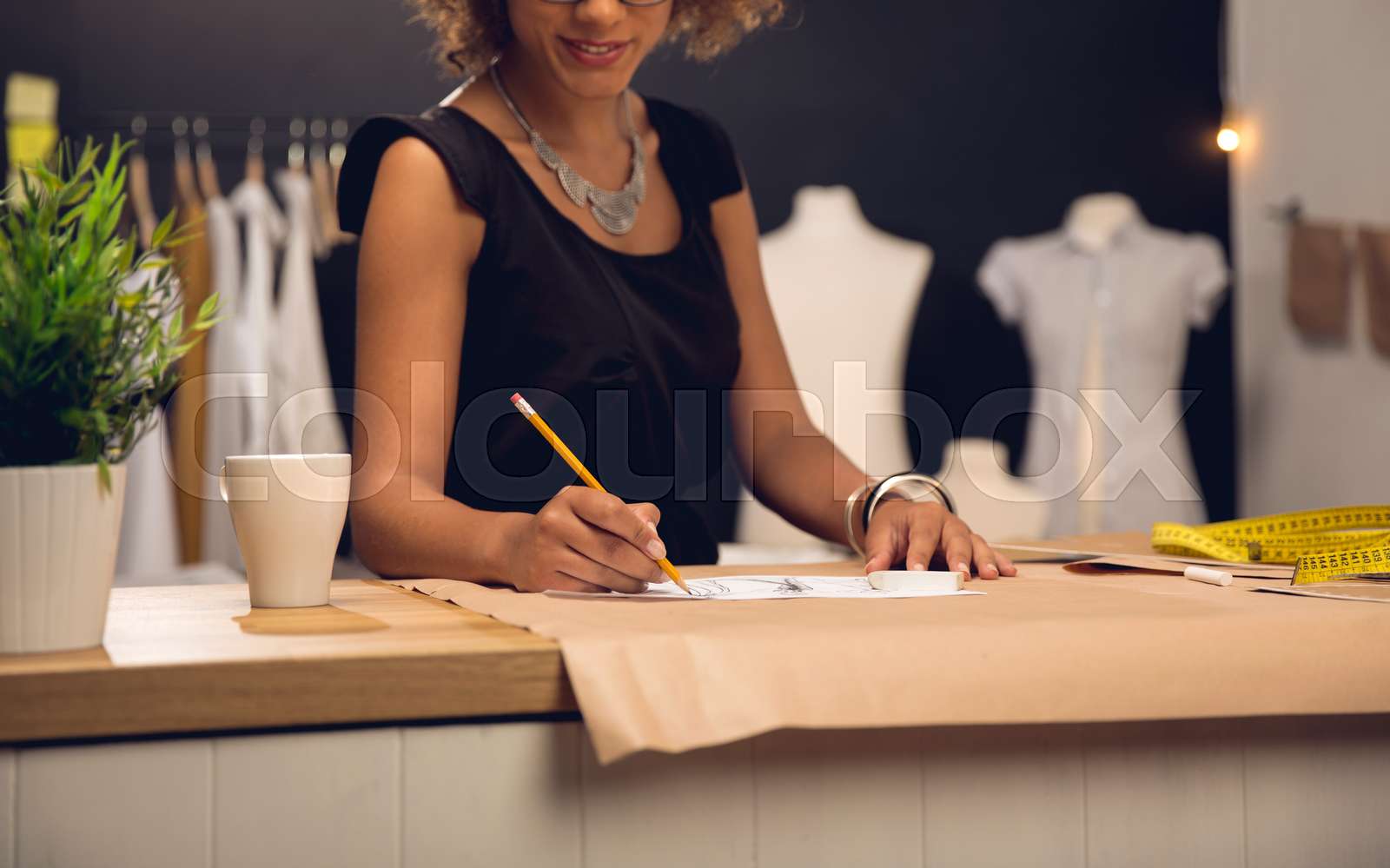 Fashion designer on her Atelier | Stock image | Colourbox