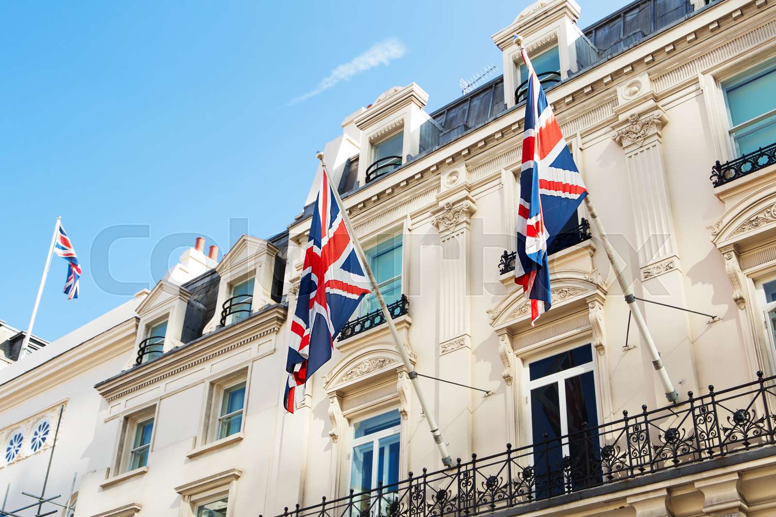 British flags on historic building in central London | Stock image ...