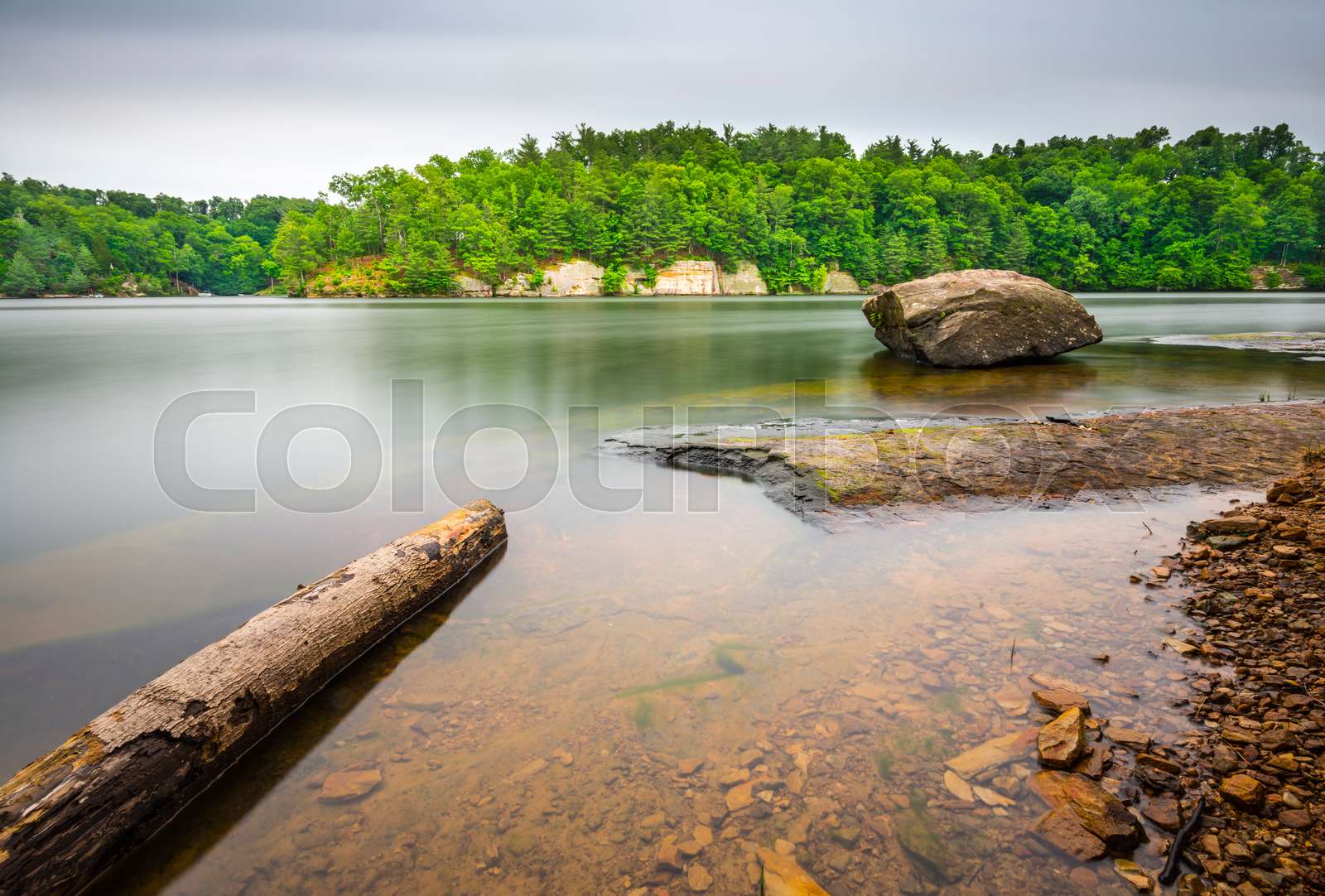 Boulder and Log at Lake Malone State Park, KY | Stock image | Colourbox