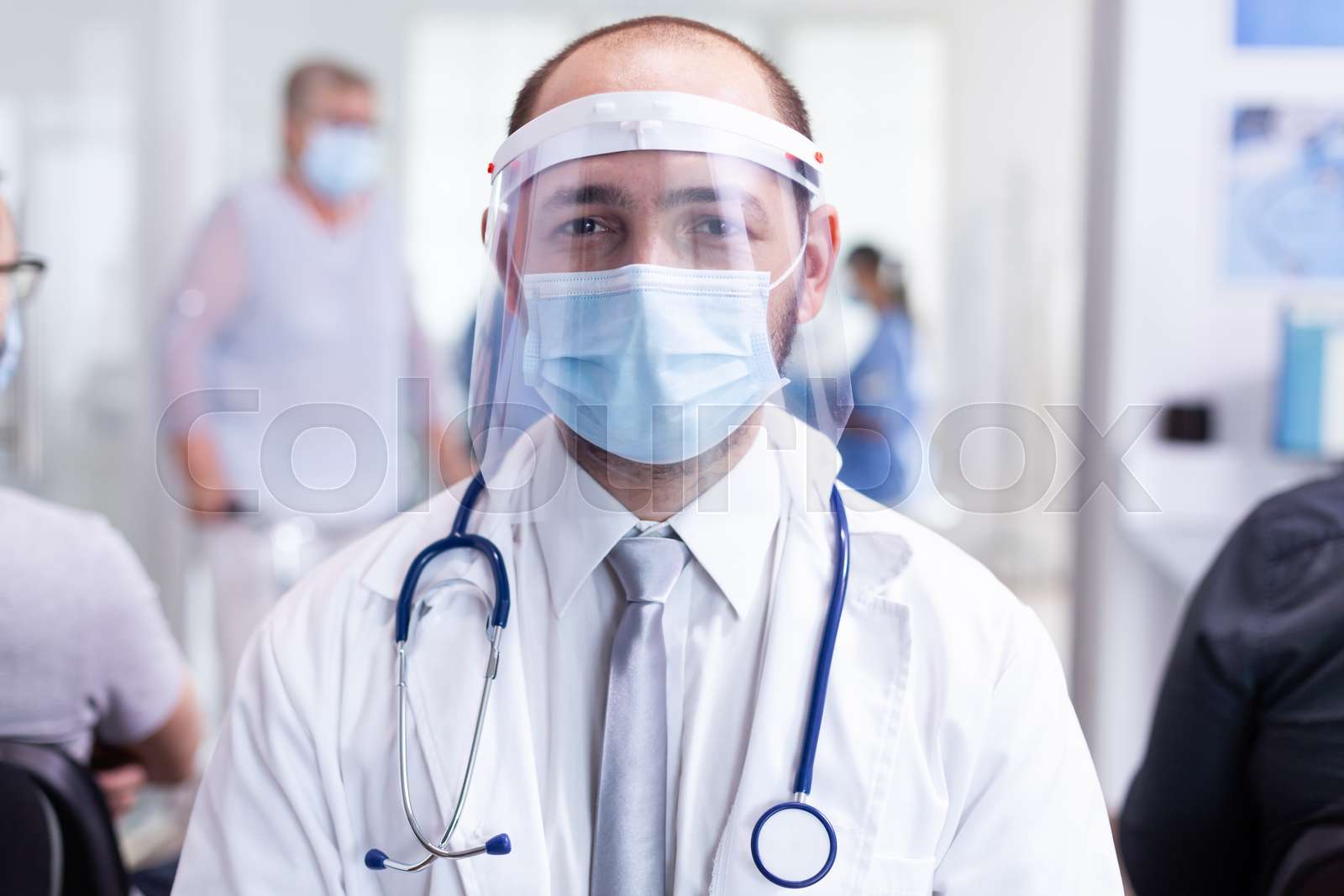 Portrait of tired medic in hallway | Stock image | Colourbox