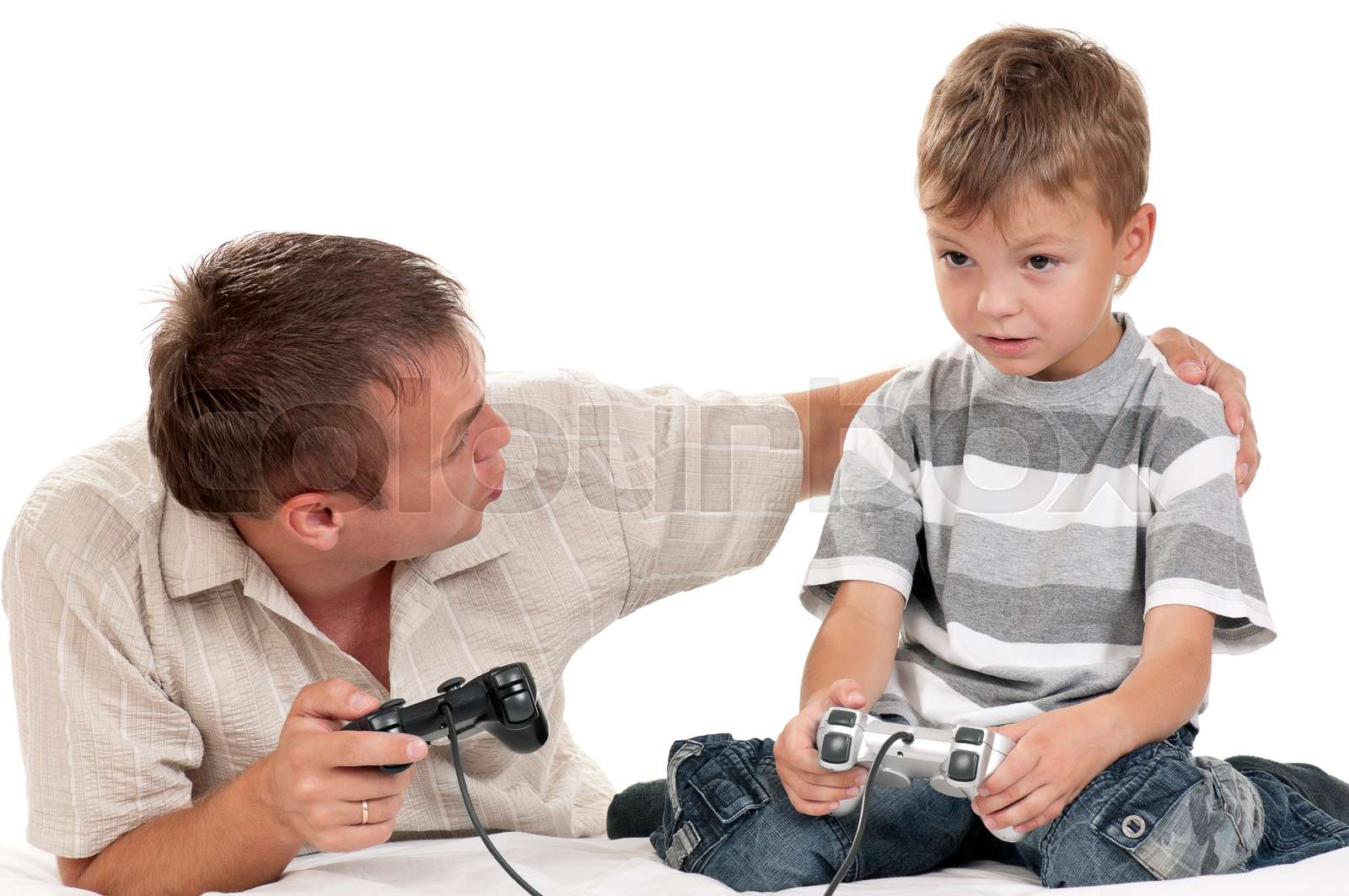 Dad And Son Playing With Joystick Stock Image Colourbox