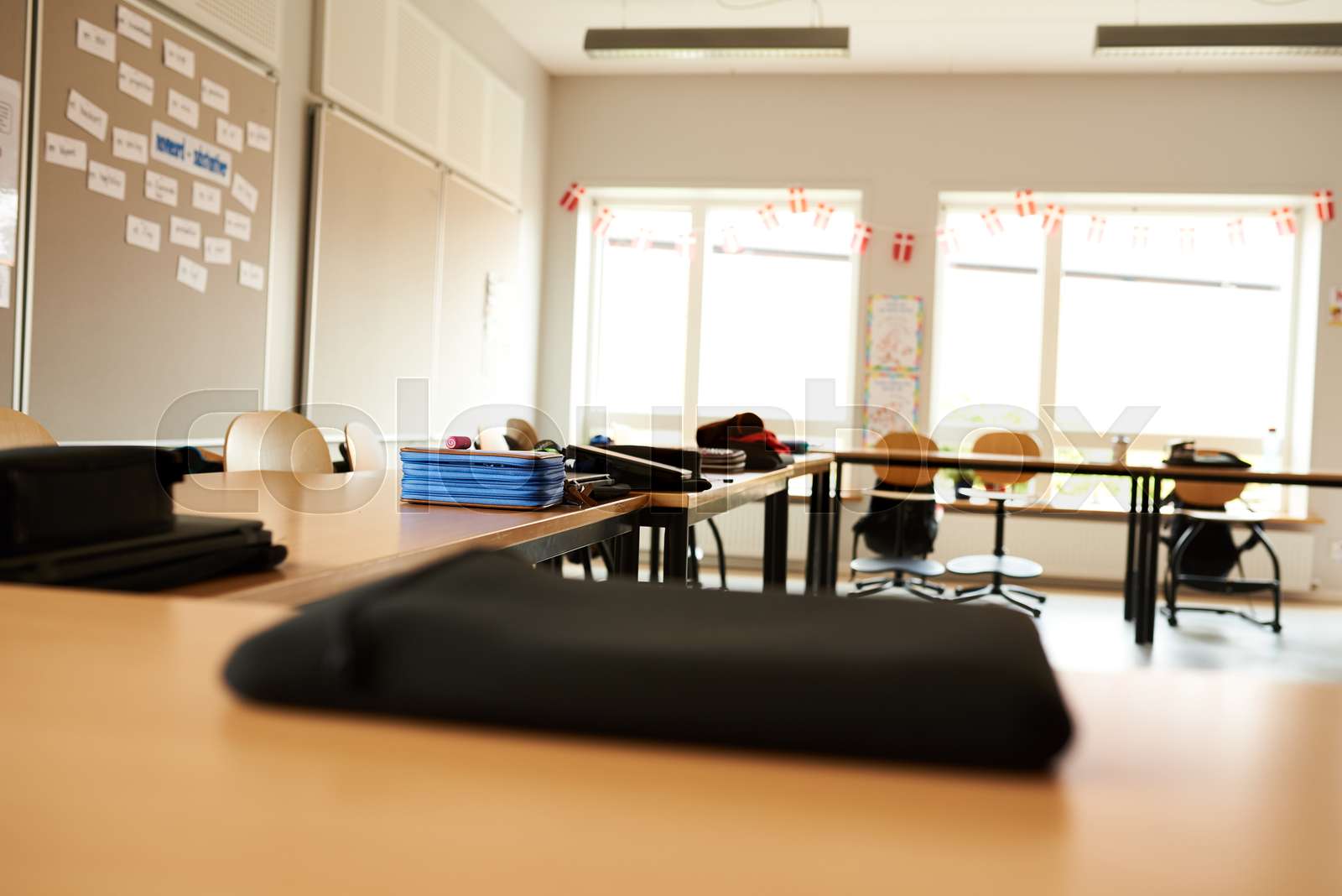 Kids table in a classroom at school | Stock image | Colourbox