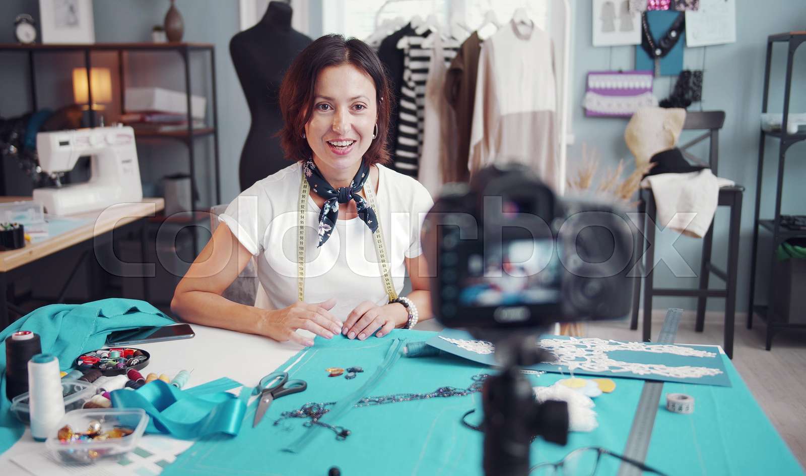 Seamstress vlogger shooting tutorial | Stock image | Colourbox