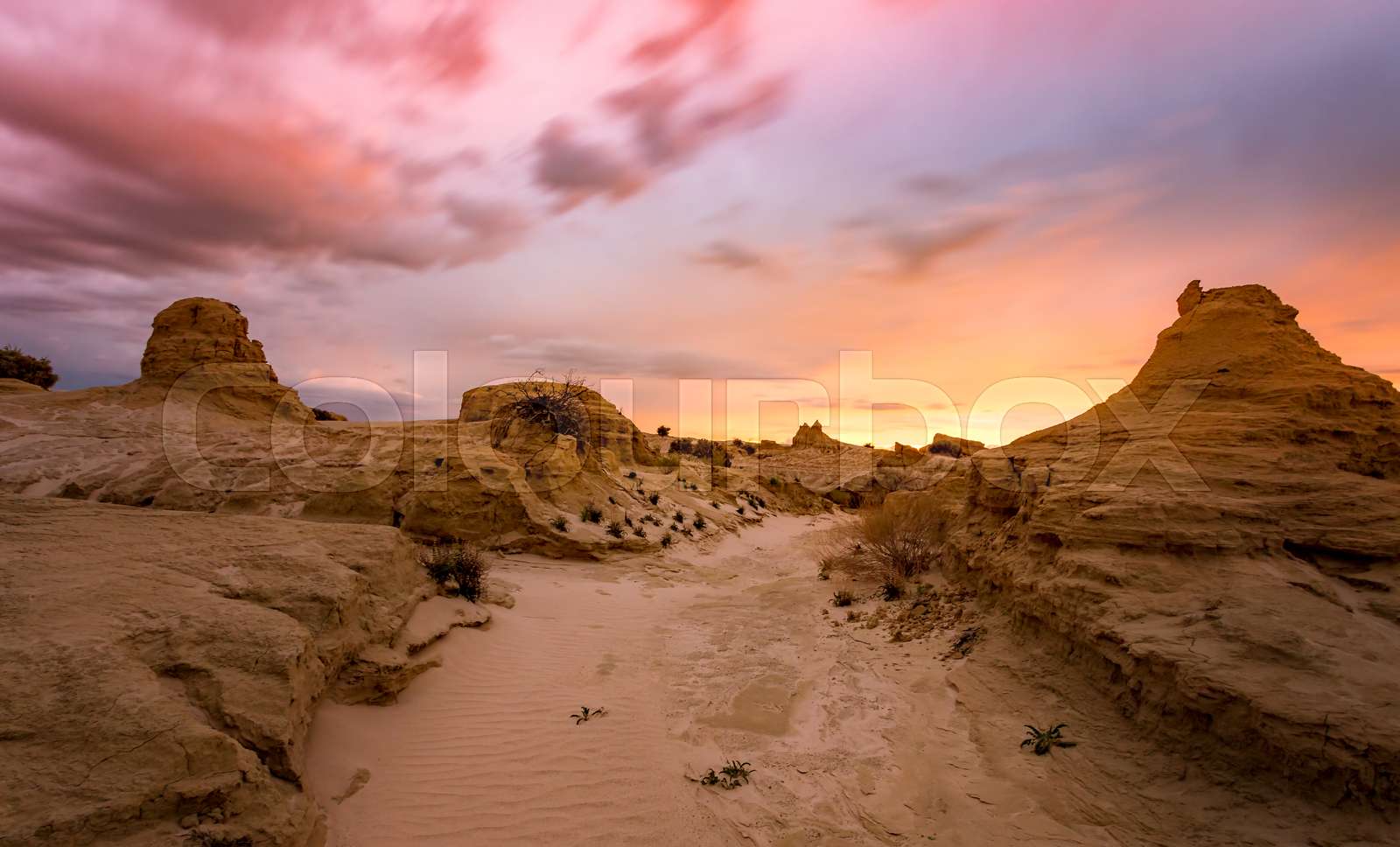 Sunset in sandy desert | Stock image | Colourbox