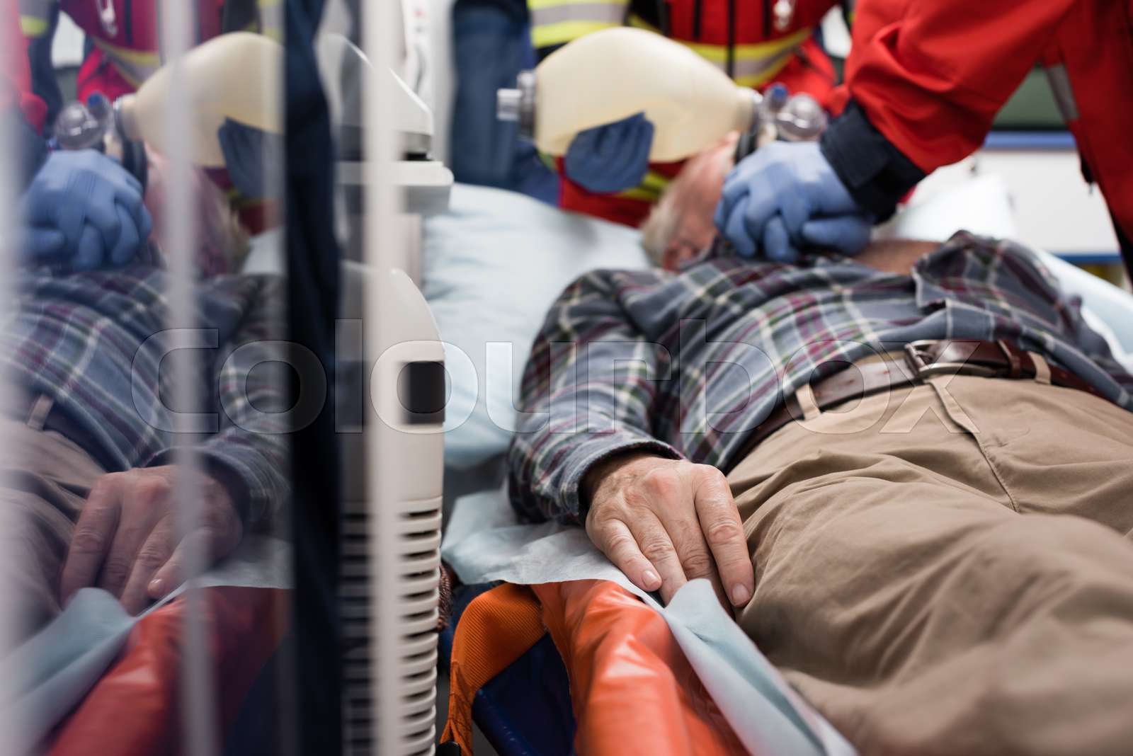 Selective Focus Of Elderly Patient Lying In Ambulance Car While