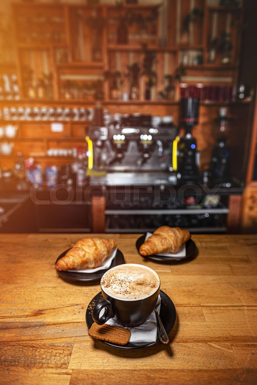 Coffee drink served with croissant | Stock image | Colourbox