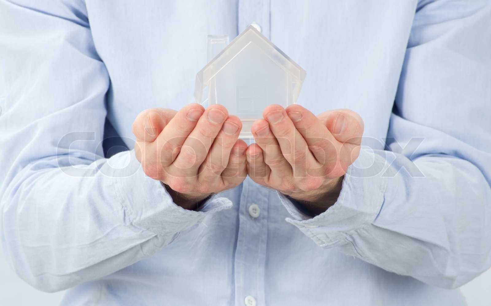 home in hands | Stock image | Colourbox