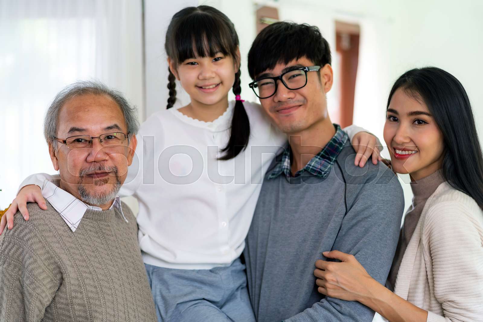 Happy multigenerational asian family portrait in living room | Stock ...