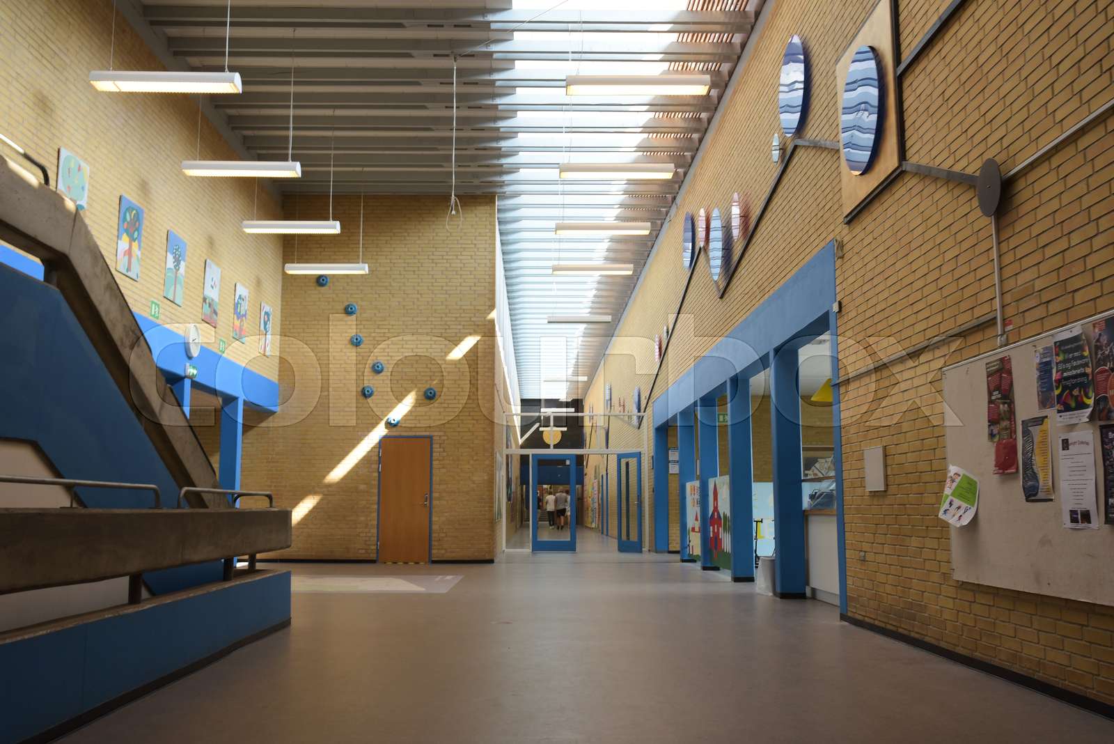 Empty school hall with sunlight coming through | Stock image | Colourbox