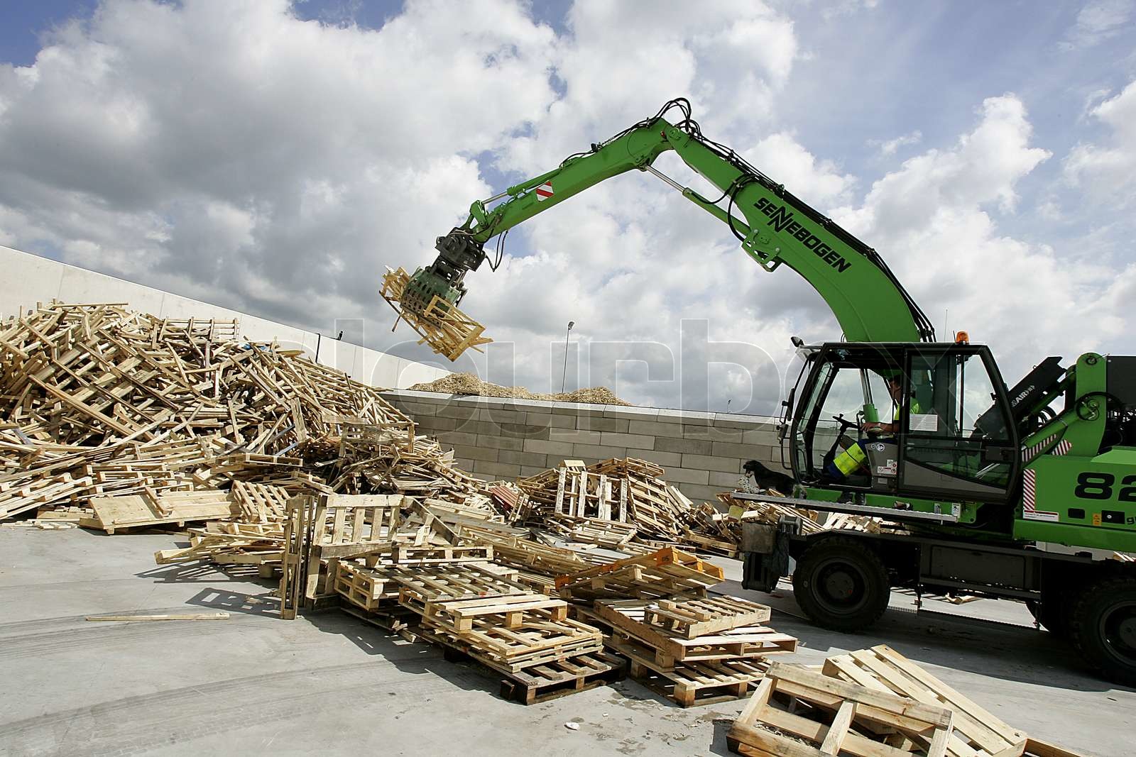 crane handling wooden pallets | Stock image | Colourbox