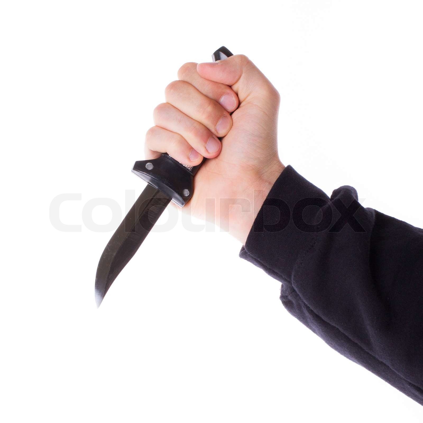 Male with a sharp knife in it's hand | Stock image | Colourbox