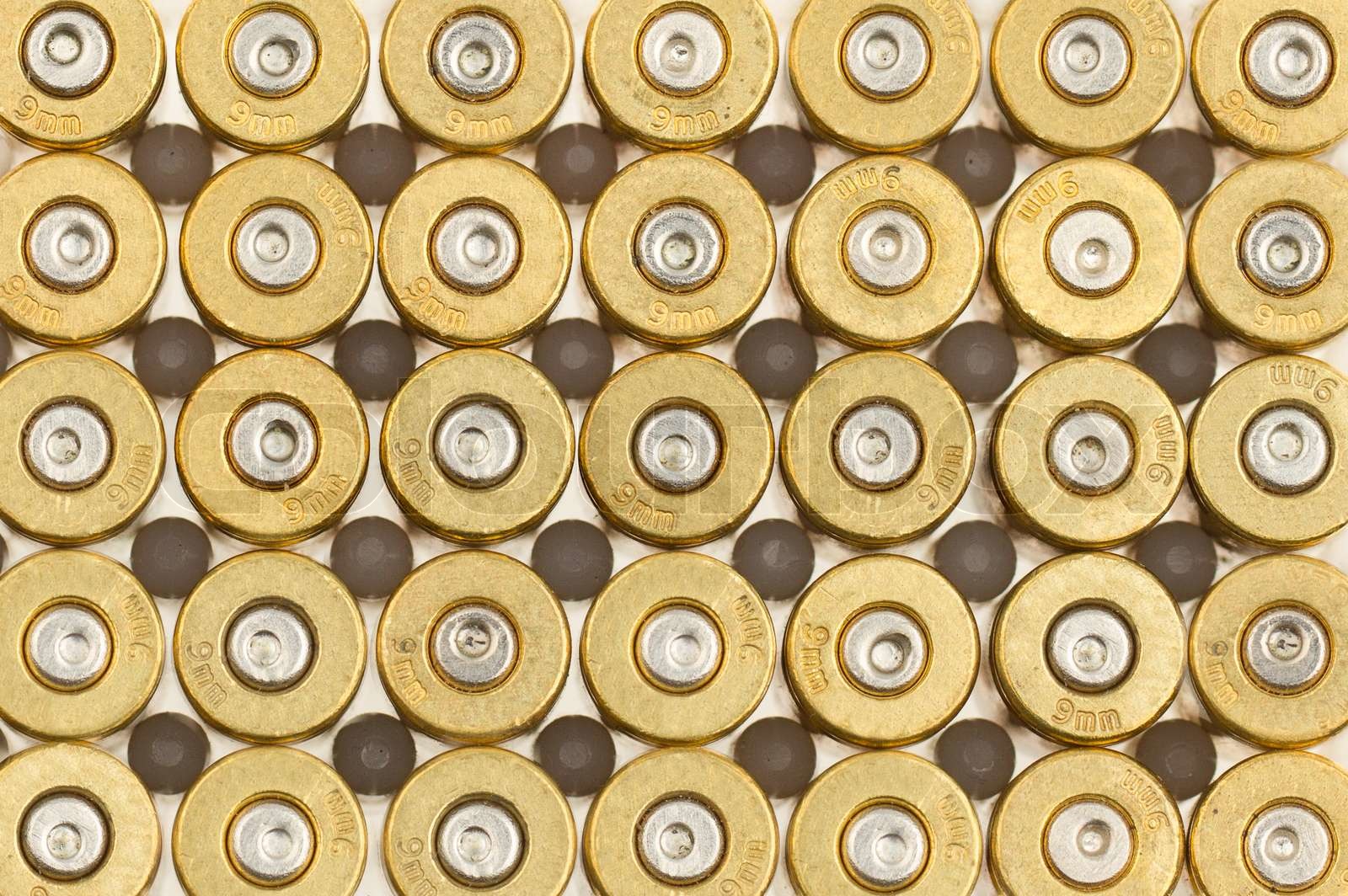 Empty 9mm bullet casings | Stock image | Colourbox