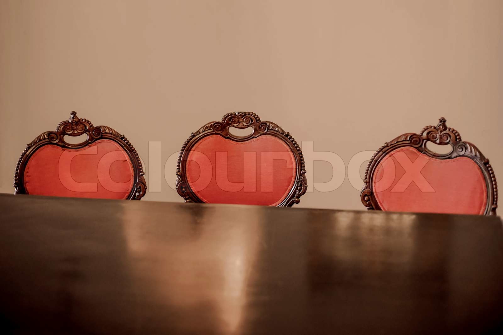 Royal meeting room with three red chairs | Stock image | Colourbox