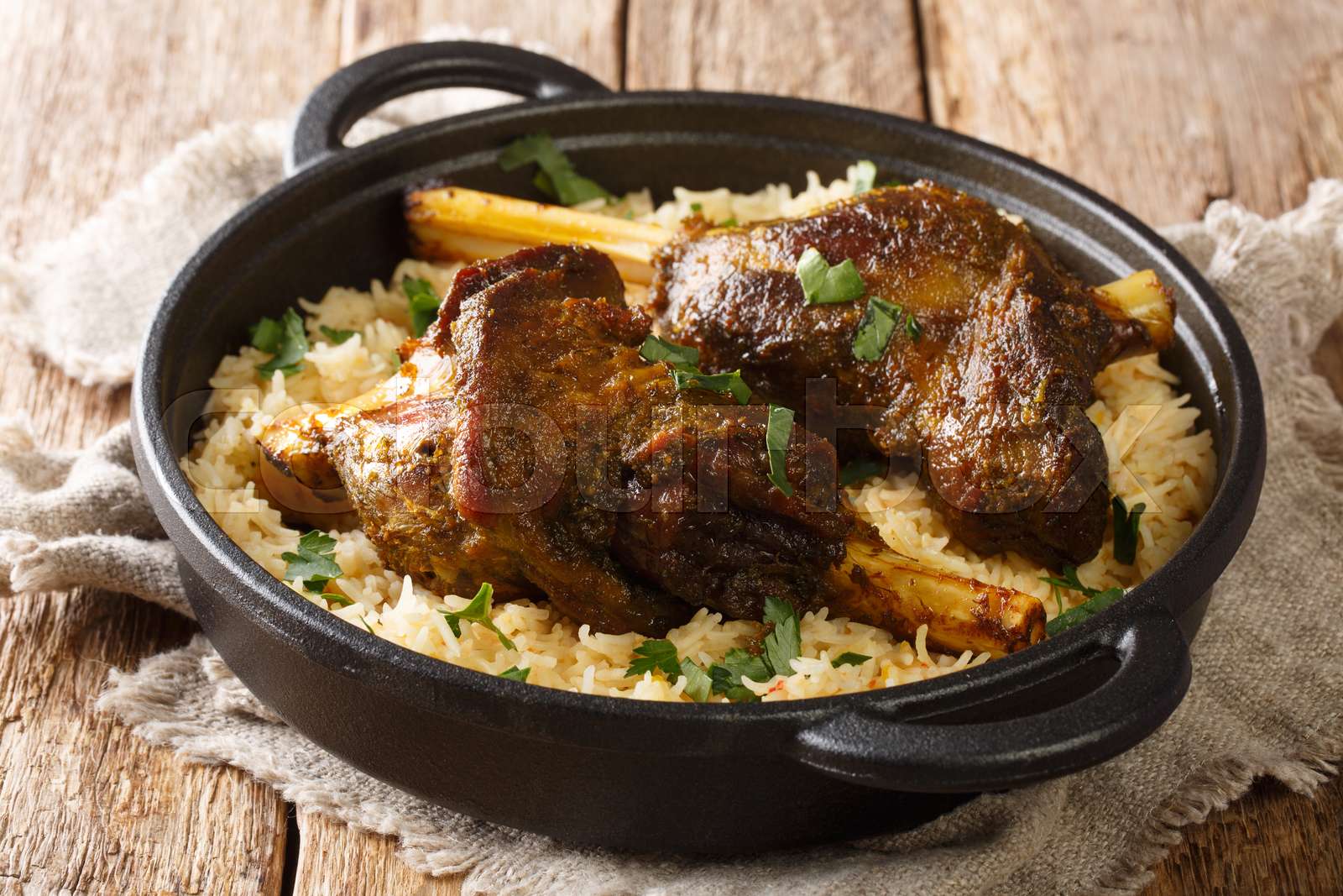 Lamb haneeth is a traditional dish with basmati rice close-up in a ...