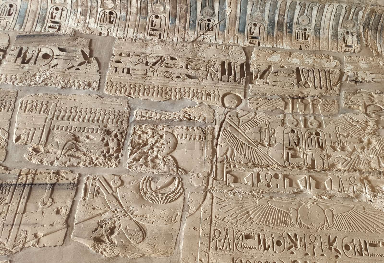 Ancient Egyptian art of hieroglyphs carving on stone | Stock image ...