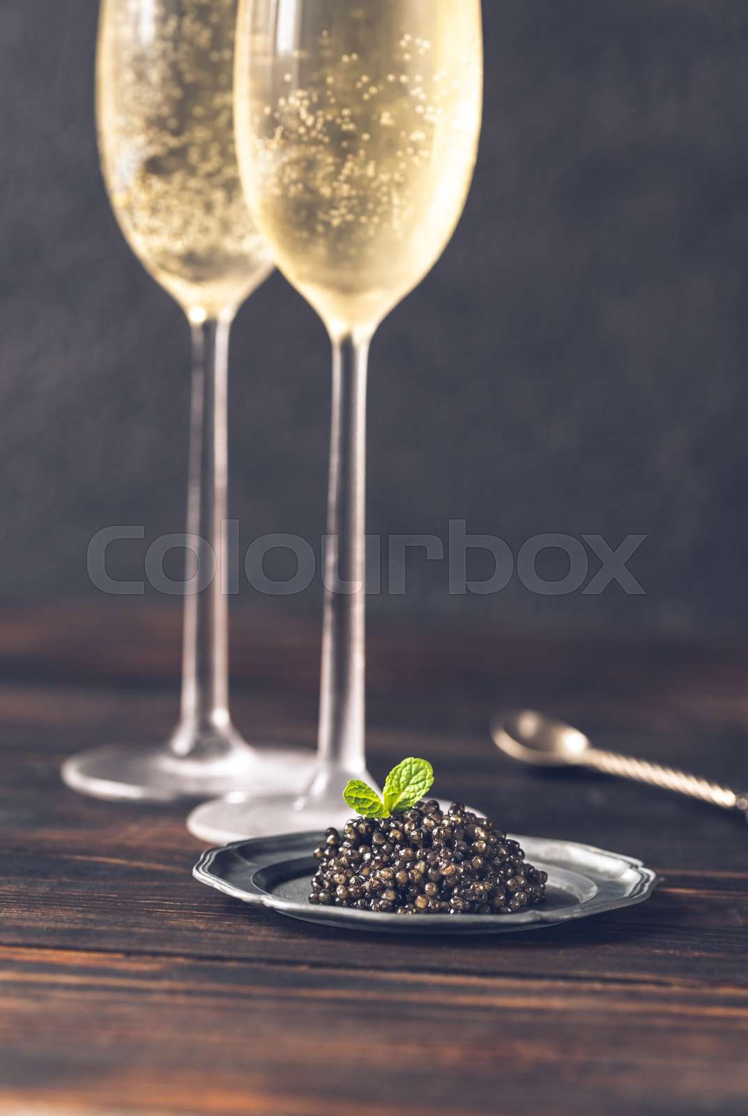 Black caviar with champagne | Stock image | Colourbox