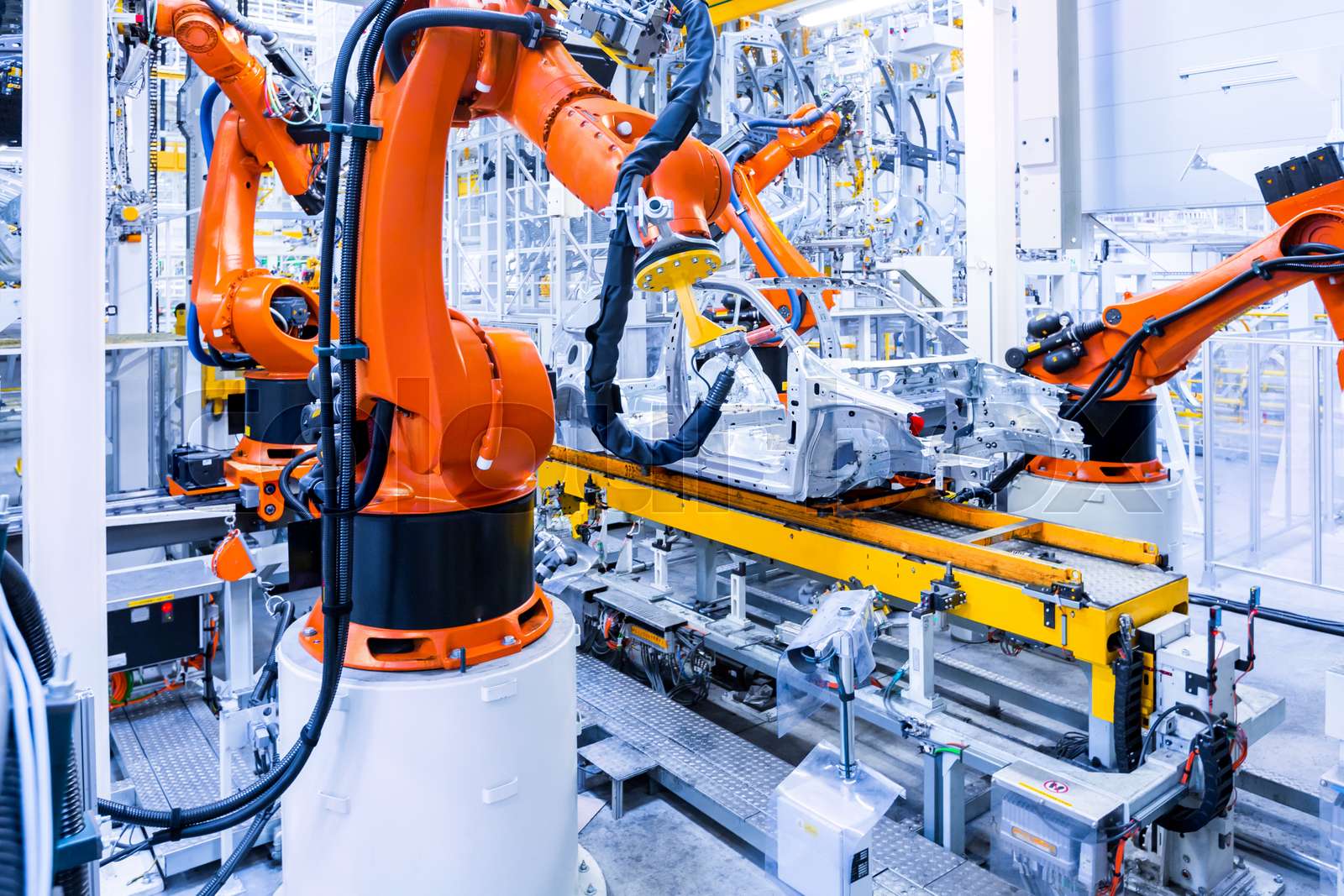 robots in a car factory | Stock image | Colourbox