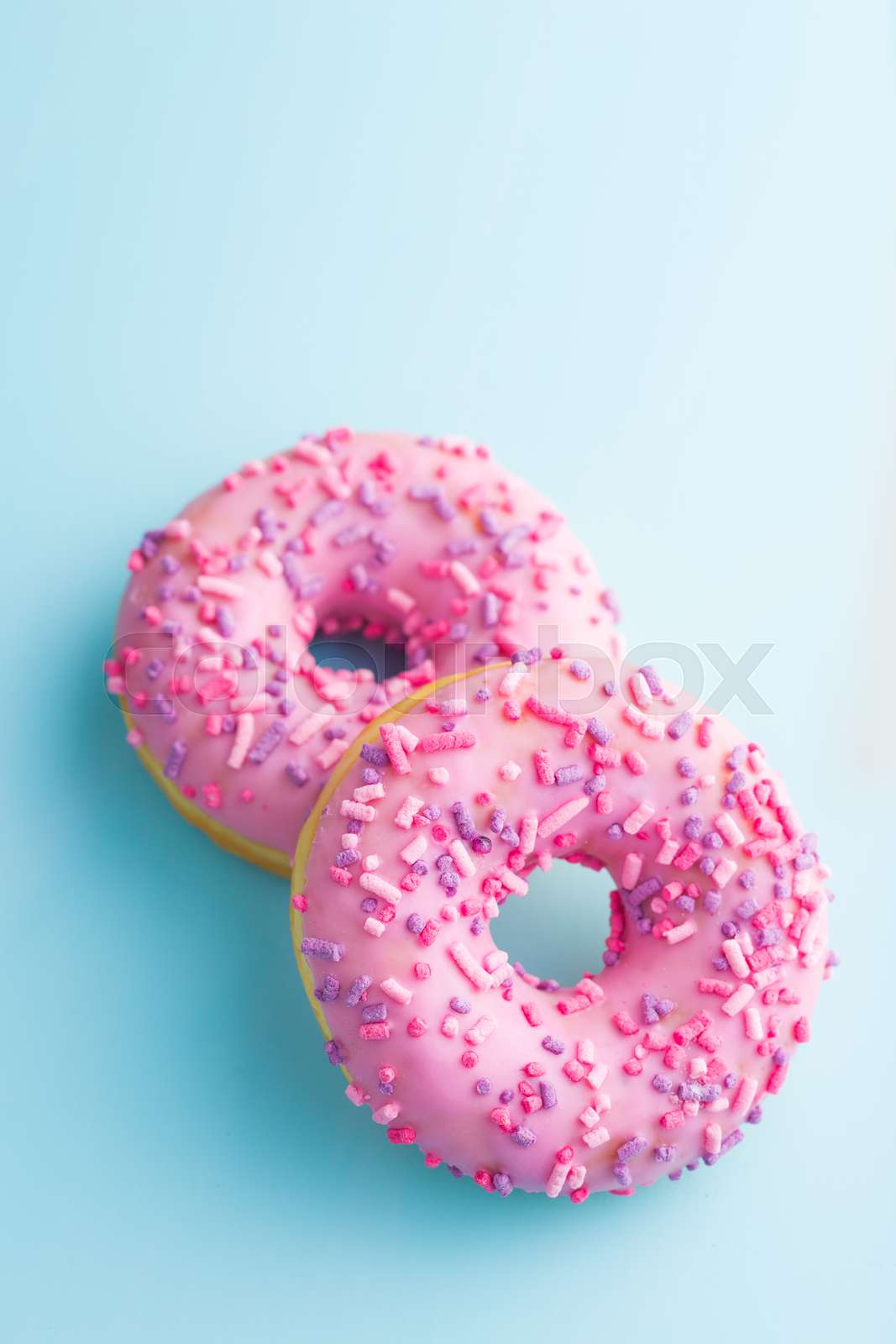 Pink And Blue Glazed Donuts