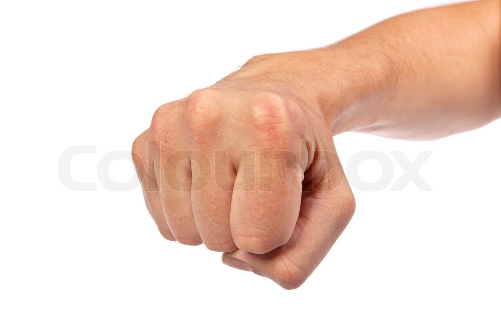 Males hand with a clenched fist isolated | Stock image | Colourbox