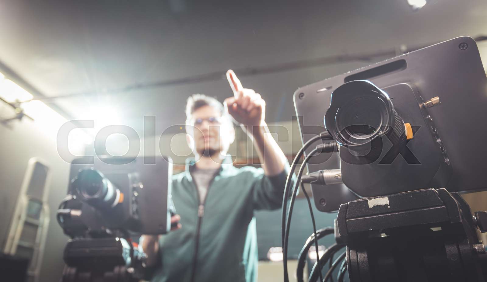 Cameraman operates a film camera, broadcasting recording studio | Stock ...