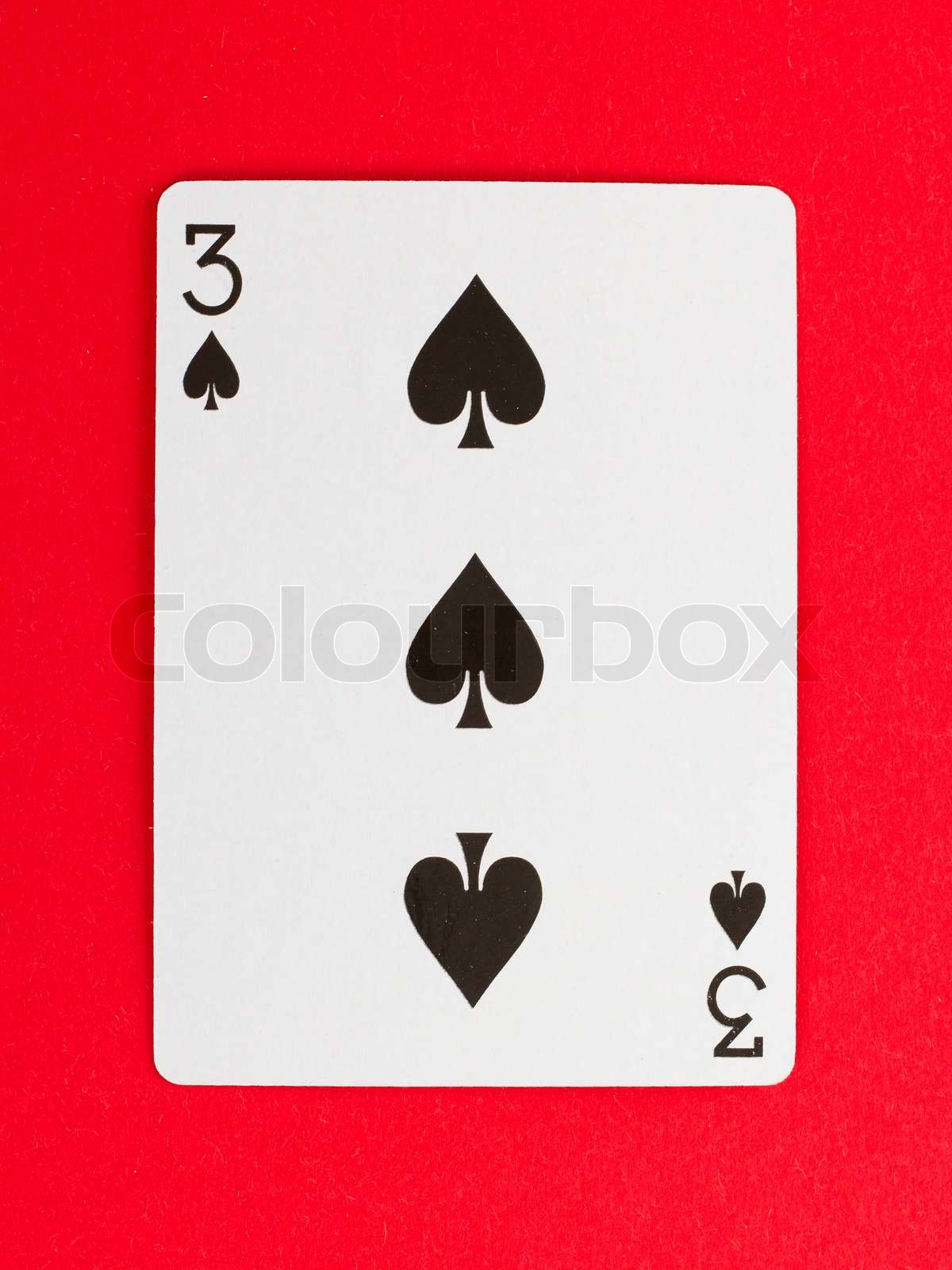 Playing card three | Stock image | Colourbox