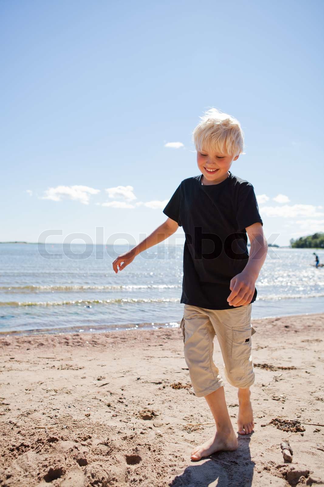 Boy on the beach | Stock image | Colourbox