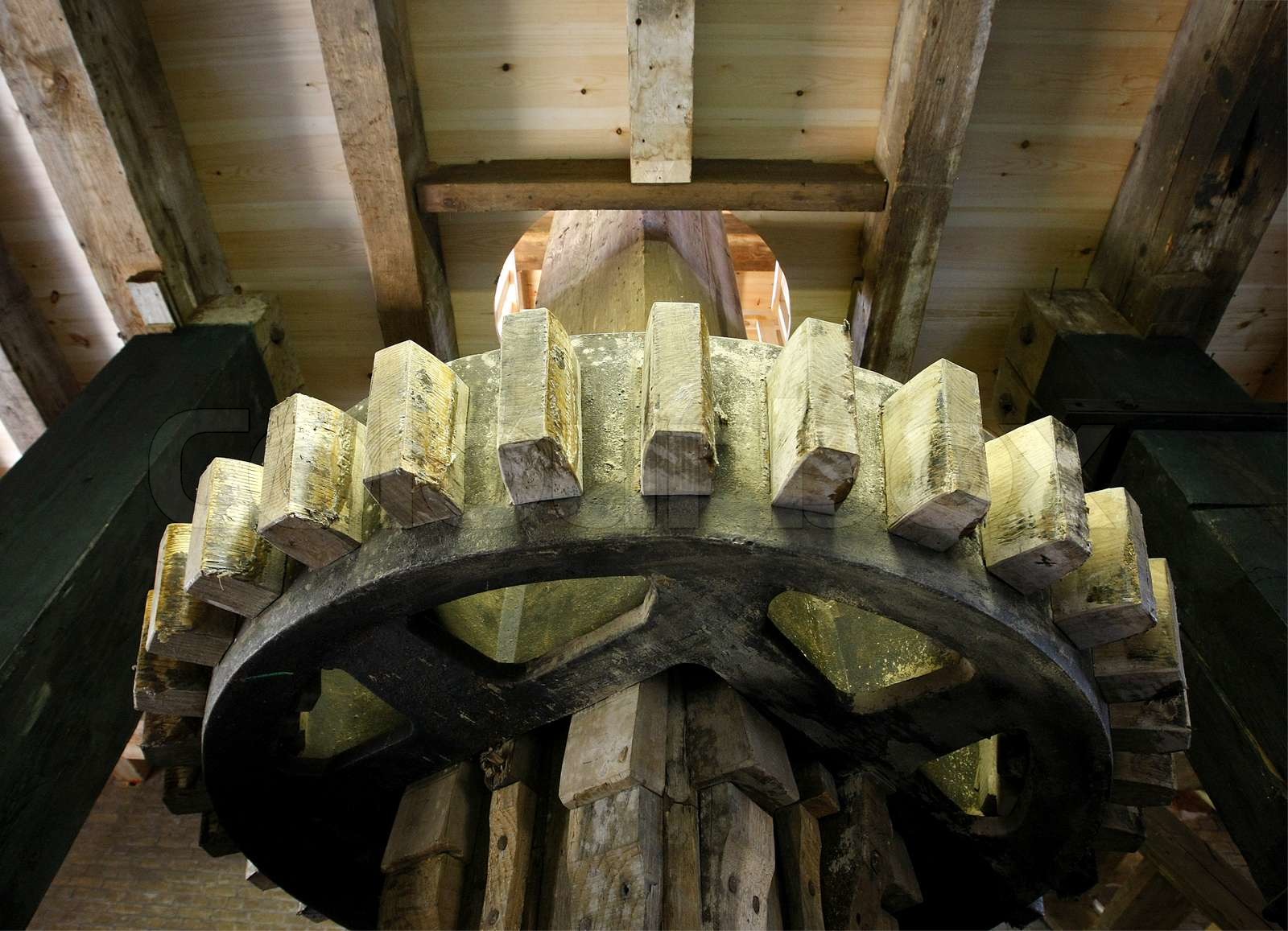 large wooden gearing wheel inside a dutch windmill | Stock image ...