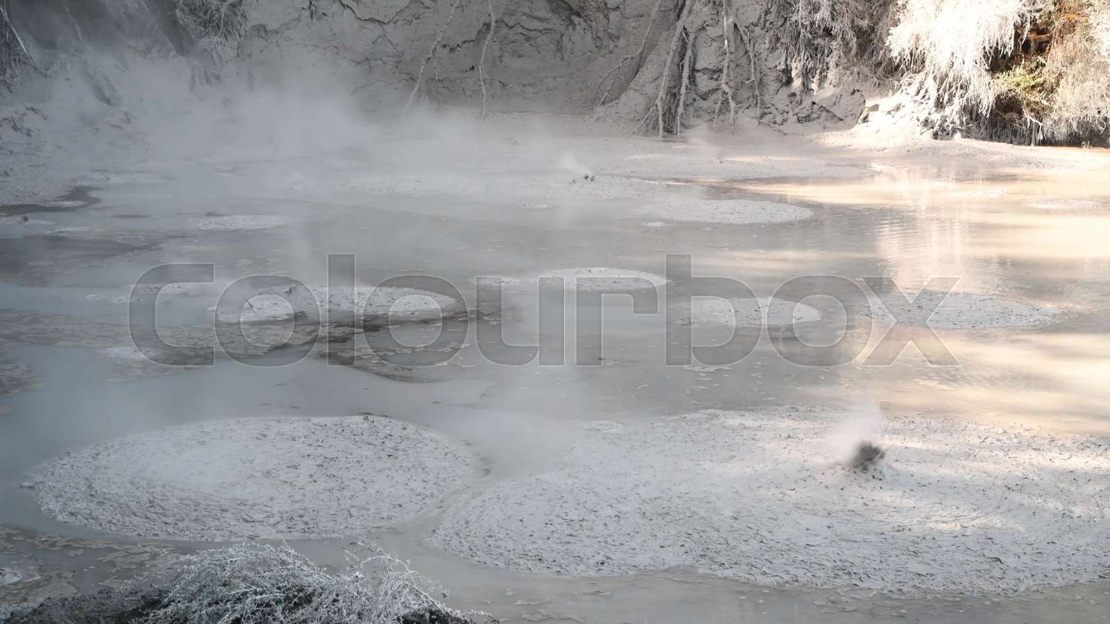 Mud Pools with boiling liquid, natural geothermal valley. Slow motion ...