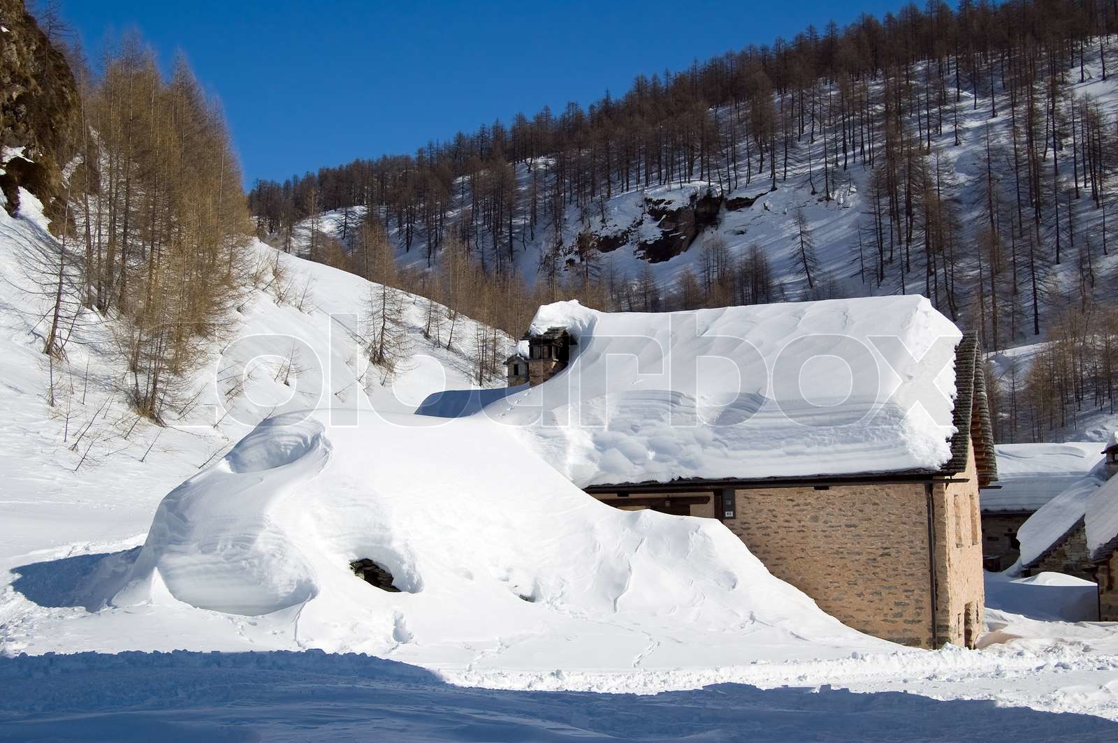 alpine house in the snow | Stock image | Colourbox