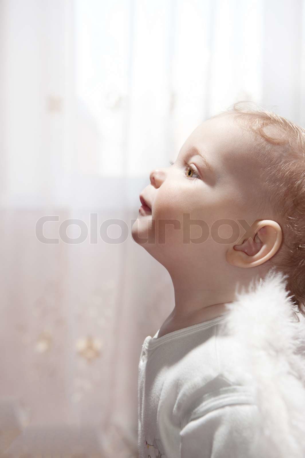 Baby face, side view | Stock image | Colourbox
