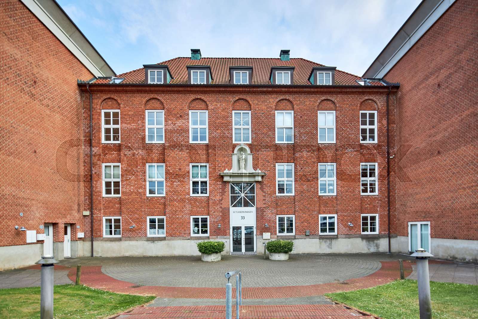 red brick building with beautiful pathway area | Stock image | Colourbox