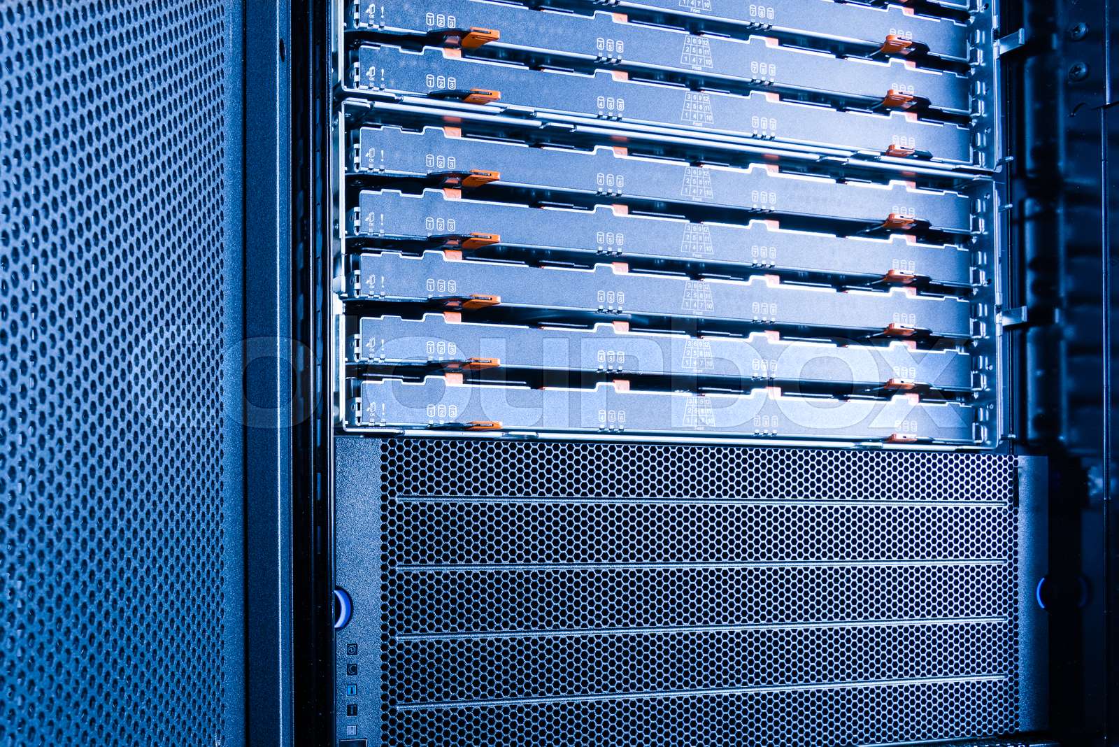 server rack with uncovered data storage arrays filled with hard - Stock ...