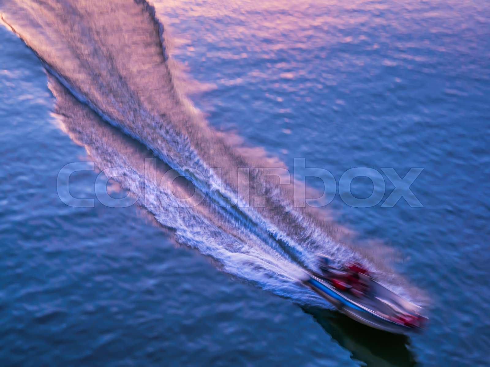 boat goes fast on a river | Stock image | Colourbox