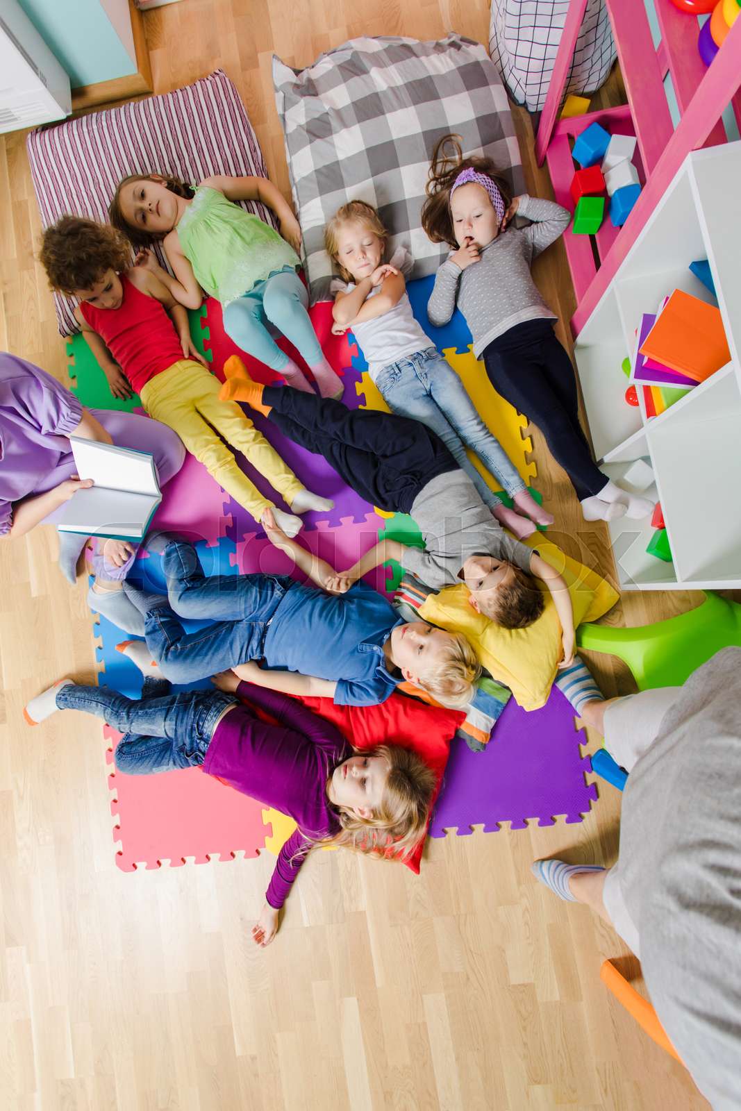 Happy Preschoolers After Nap Time At The Kindergarten Stock Image happy-preschoolers-after-nap-time-at-the-kindergarten-stock-image
