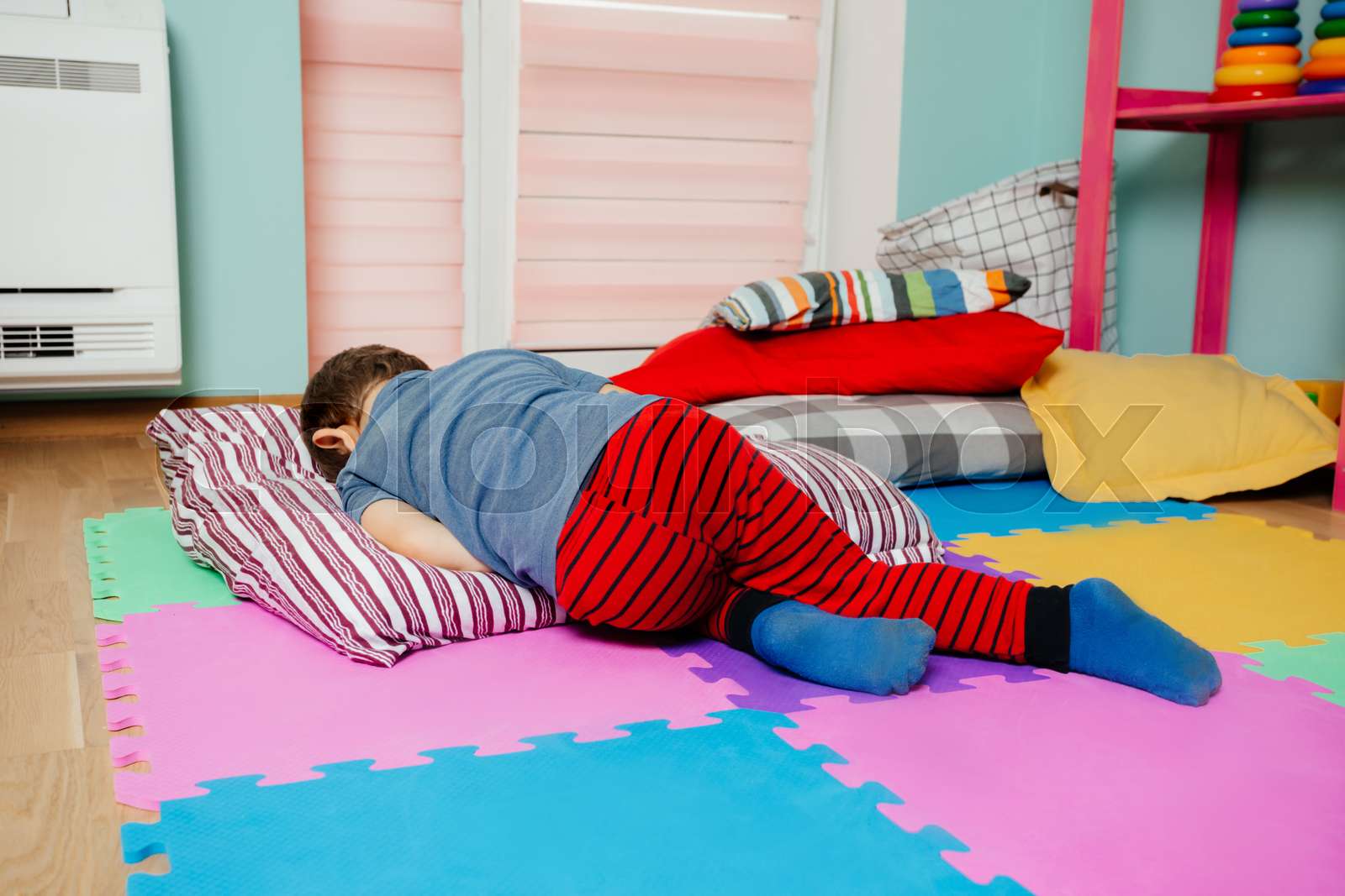 Little boy sleeping while nap time at the kindergarten | Stock image ...