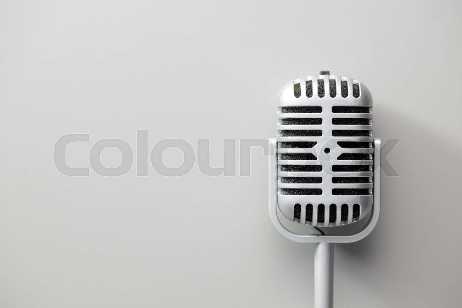 Metal retro microphone. Vintage microphone. | Stock image | Colourbox