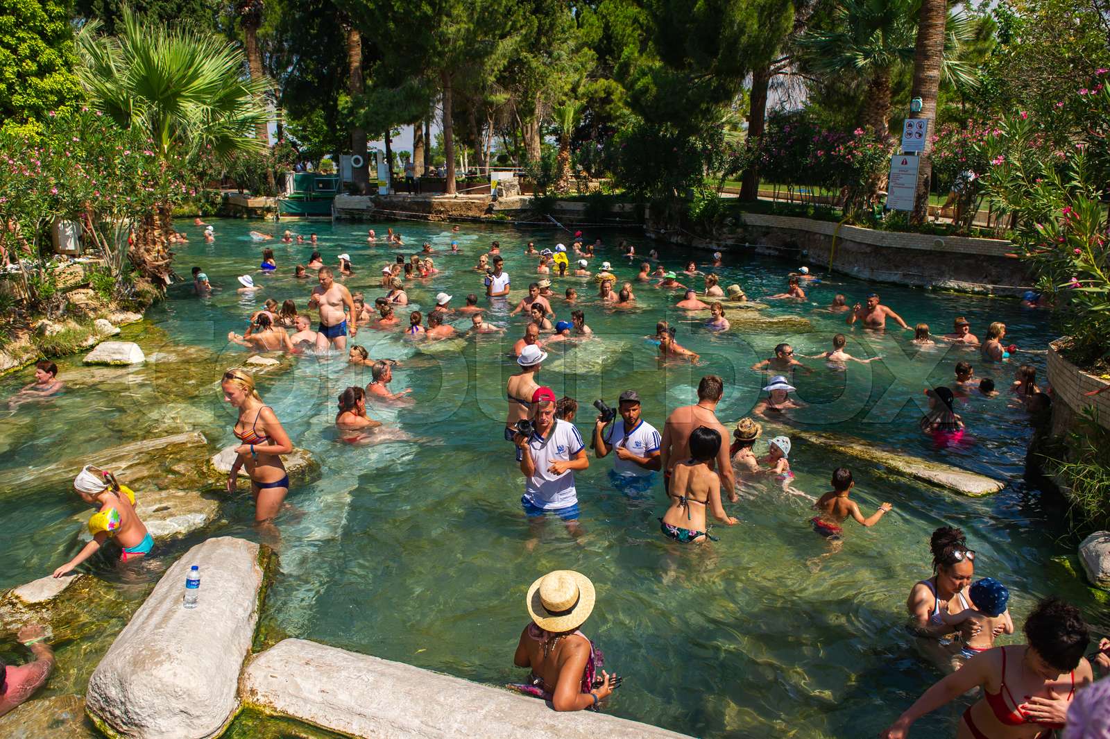 PAMUKKALE, TURKEY-JUNE 23, 2018: Unknown tourists swim in the Ancient ...