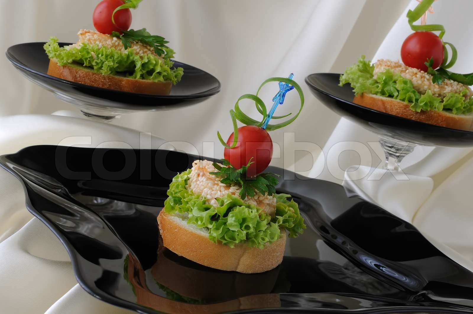 Canapes of chicken with sesame | Stock image | Colourbox