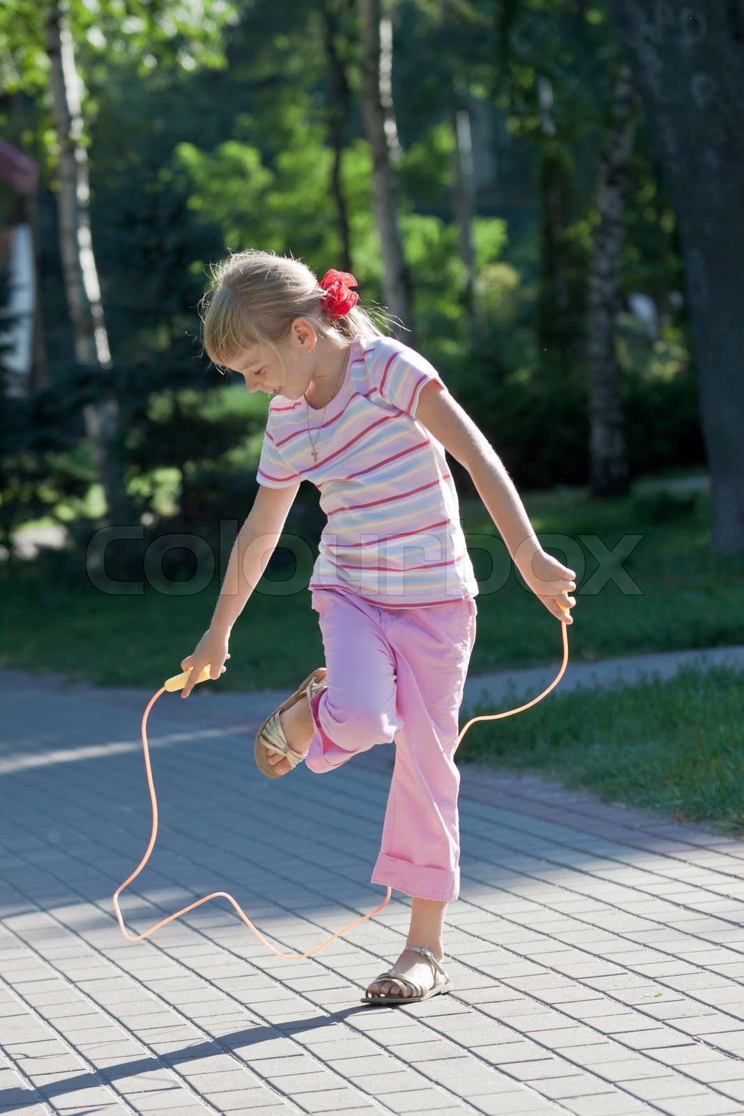 Cute girl having fun | Stock image | Colourbox