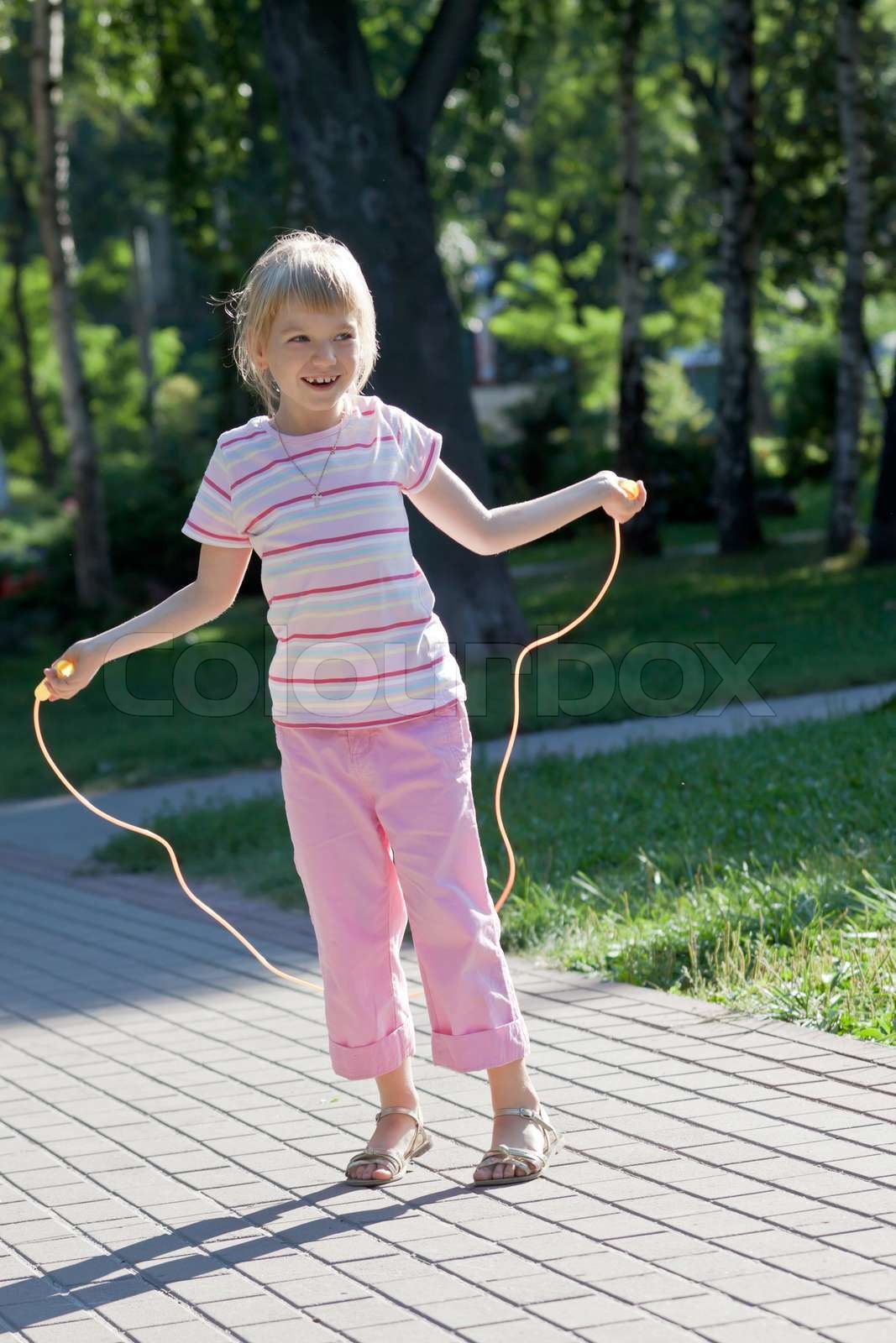 Cute girl having fun | Stock image | Colourbox