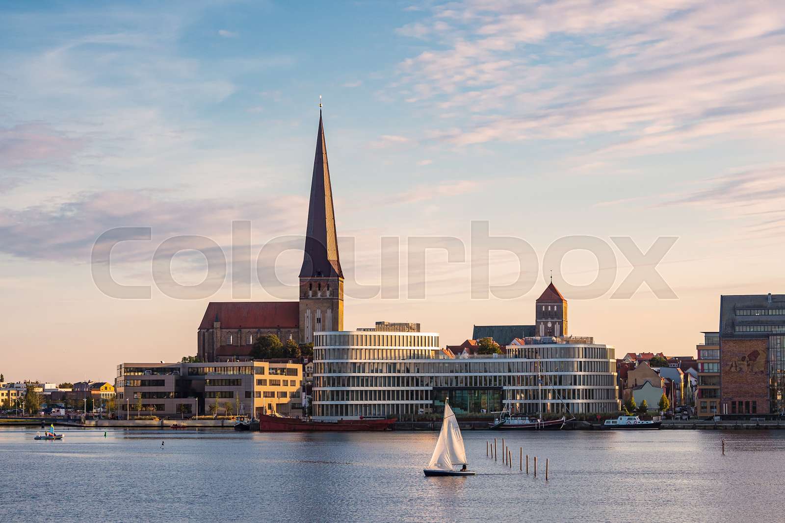 View over the river Warnow to the city Rostock, Germany | Stock image ...
