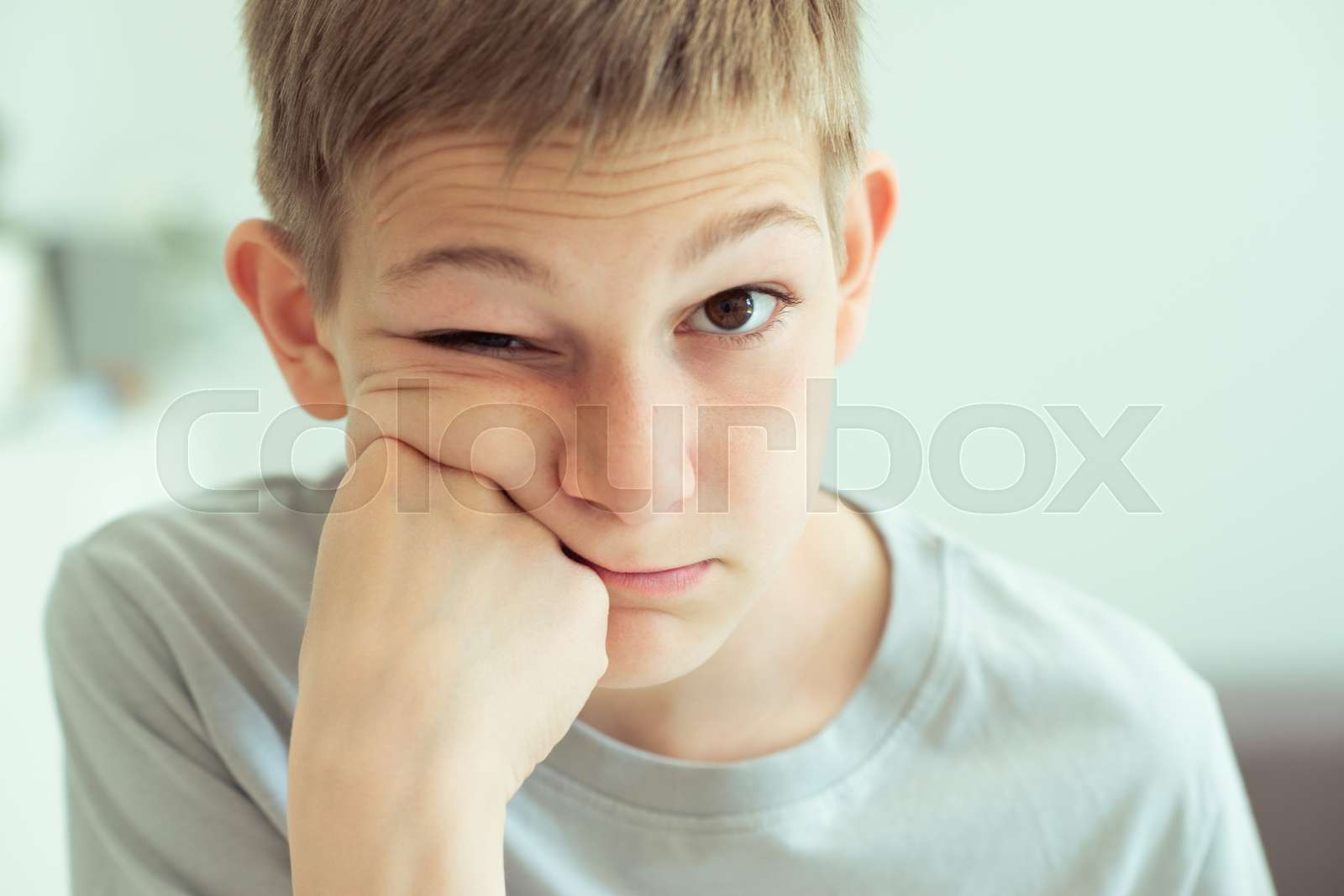 Closeup portrait of disappointed teen boy | Stock image | Colourbox