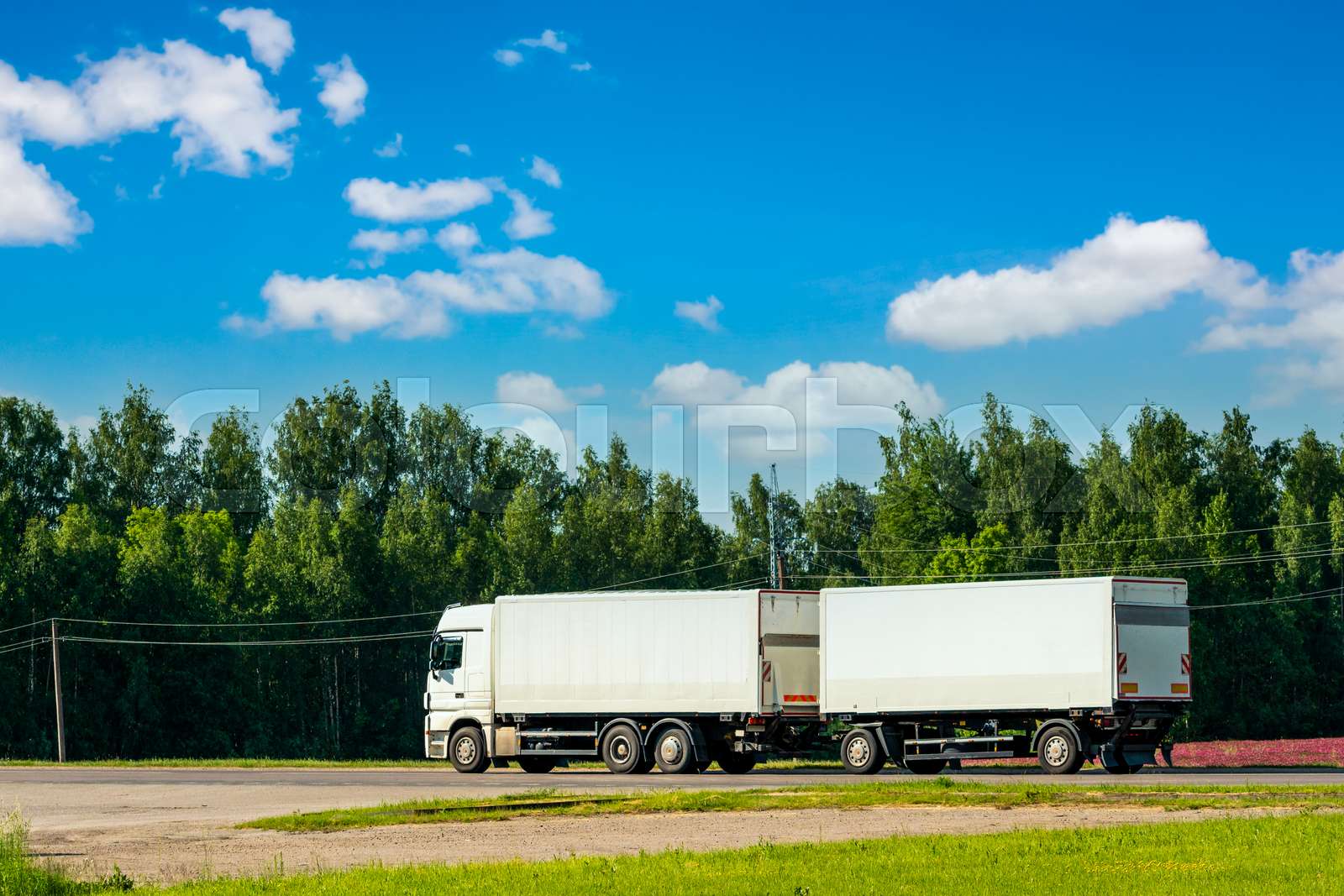 Road transport of goods by truck | Stock image | Colourbox