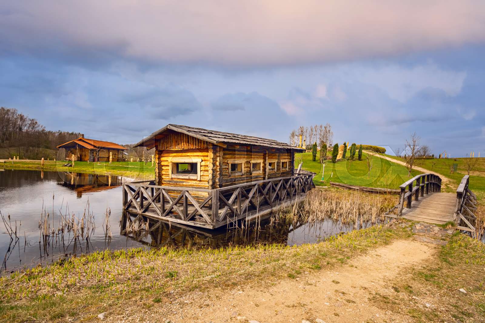 Old wooden cabin on the water | Stock image | Colourbox