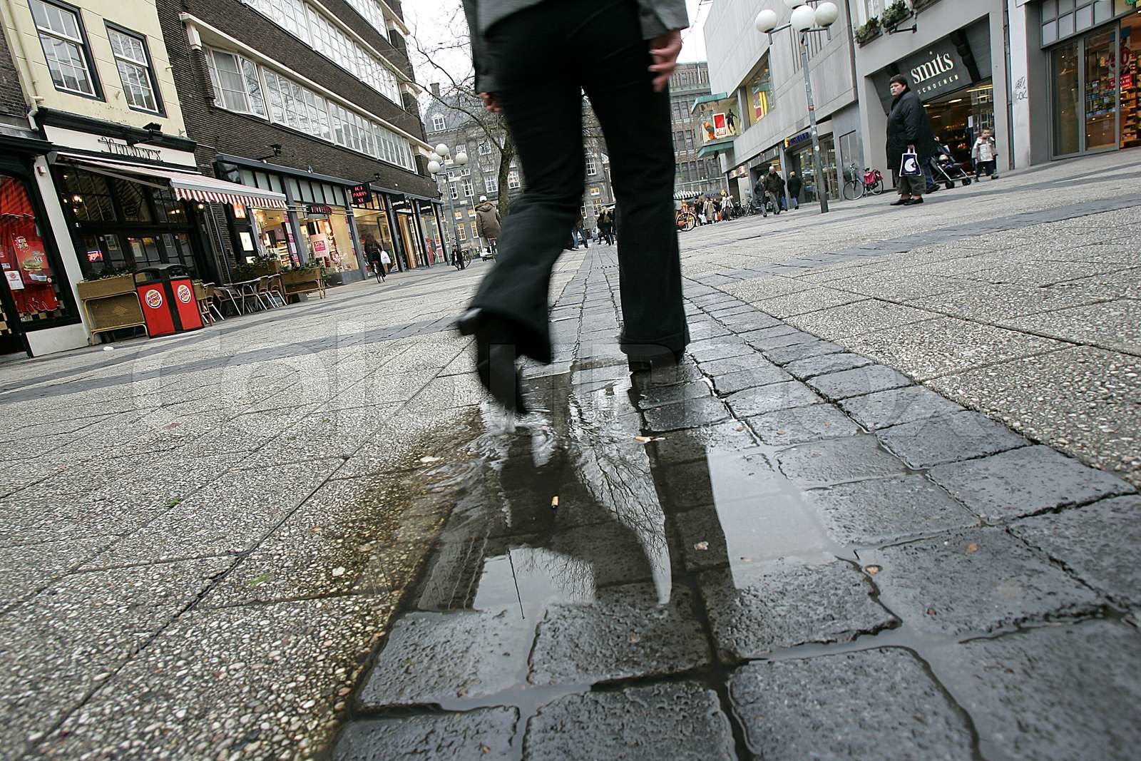 water puddle on bad pavement | Stock image | Colourbox