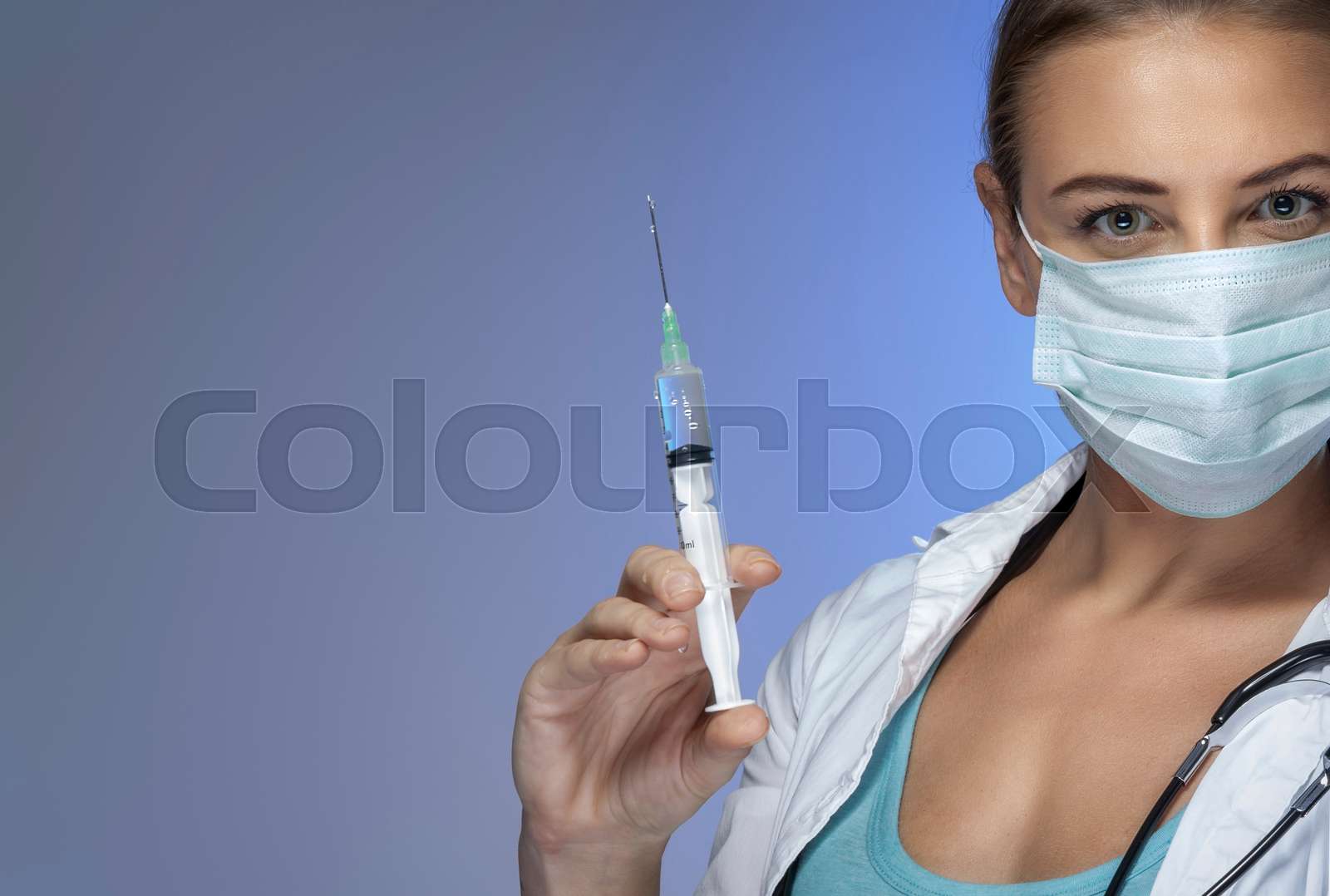 Doctor with an Injector | Stock image | Colourbox