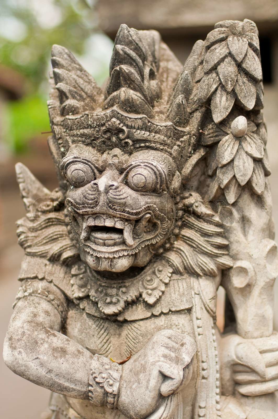 Statue of Balinese demon in Ubud, Indonesia | Stock image | Colourbox