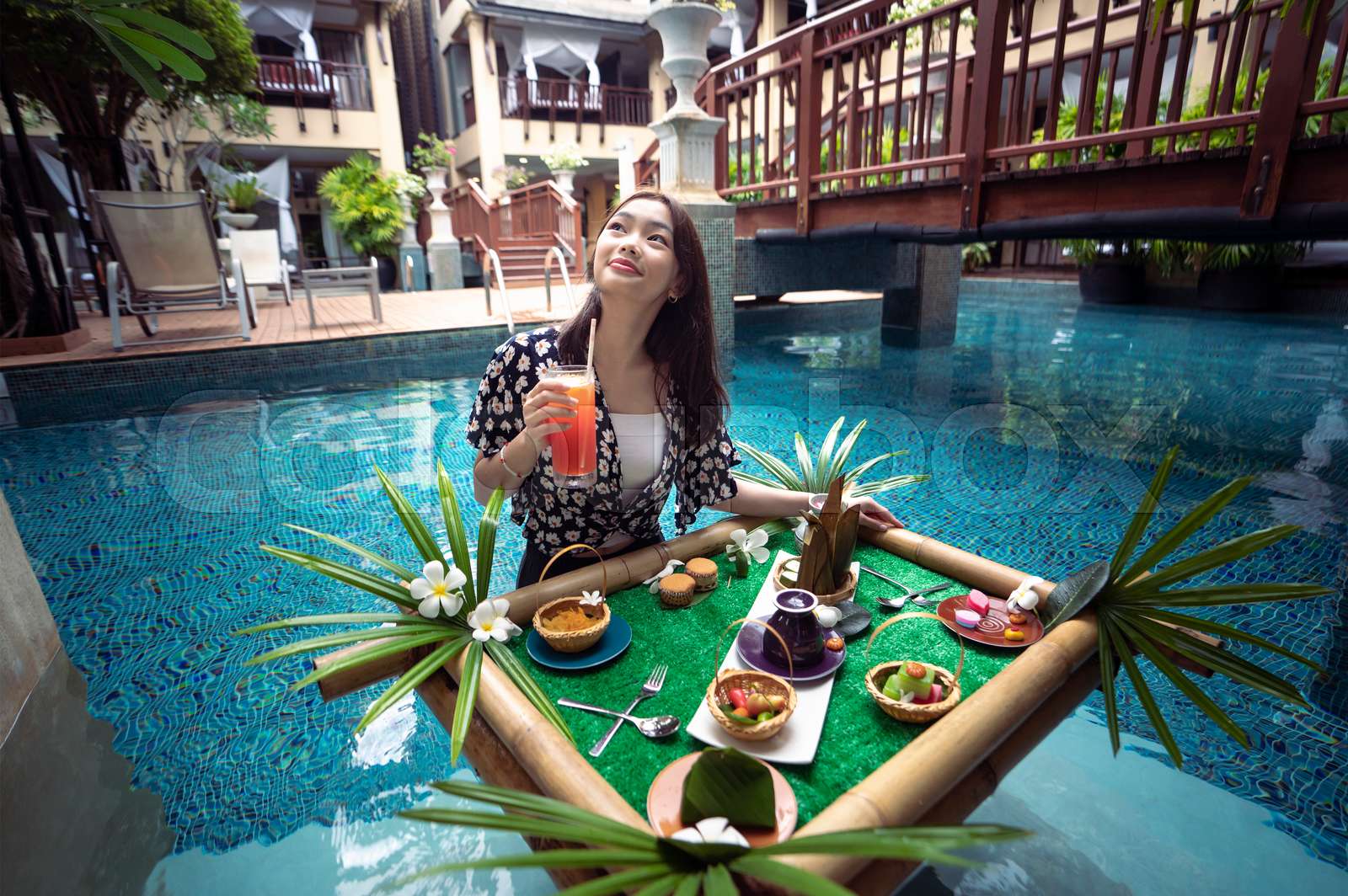 Thaifood breakfast tray in swimming pool | Stock image | Colourbox